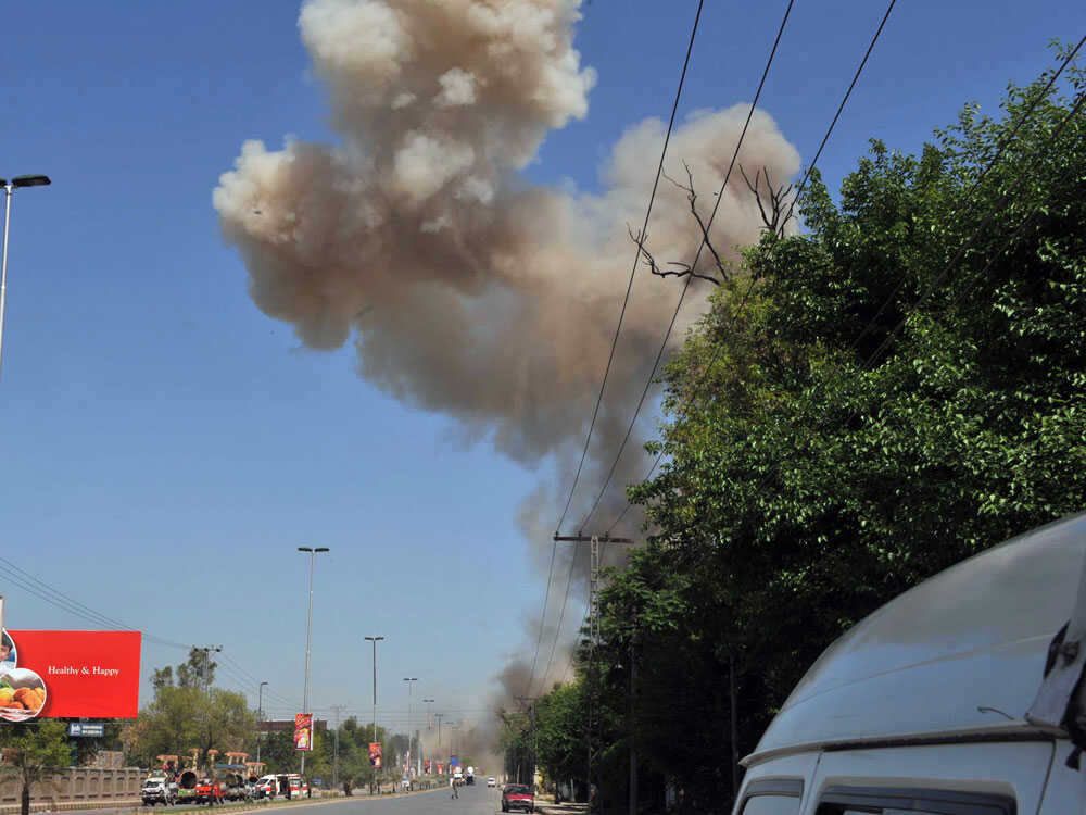 Multiple Attacks, Some Aimed At U.S. Consulate, Kill Dozens In Pakistan ...