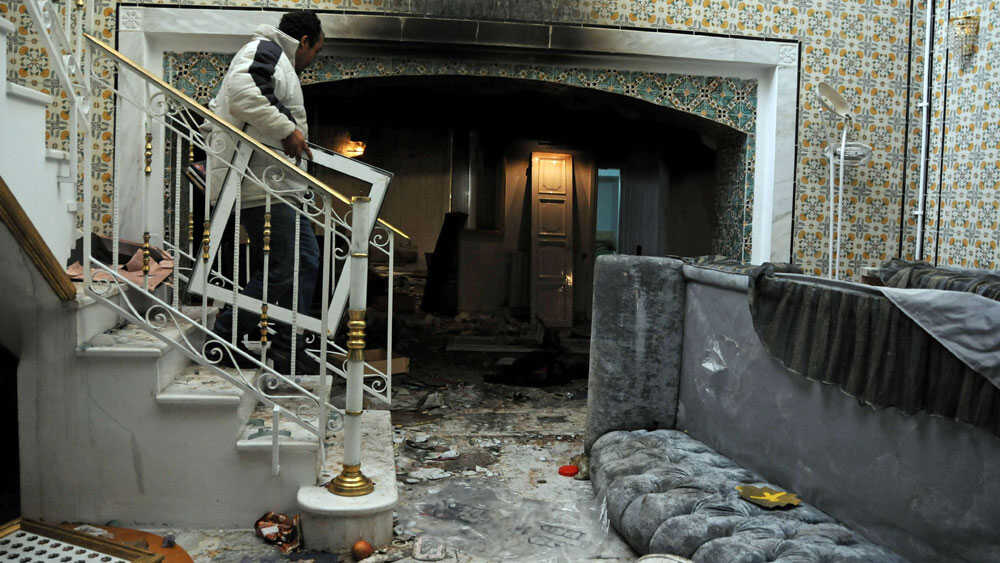 Tunisians Loot Lavish Homes Of Former Ruling Clan : NPR