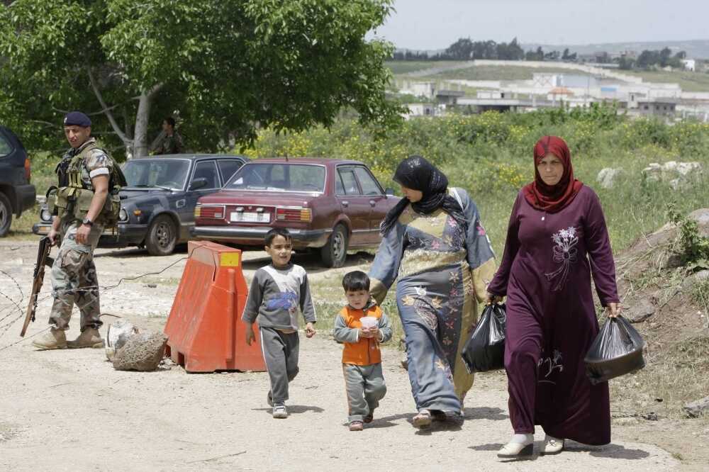 Fleeing Violence, Syrians Cross Lebanon Border : NPR