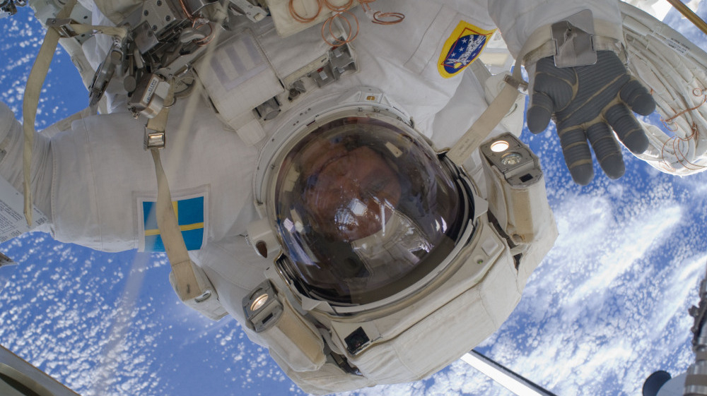 Astronauts Floating In Spaceship