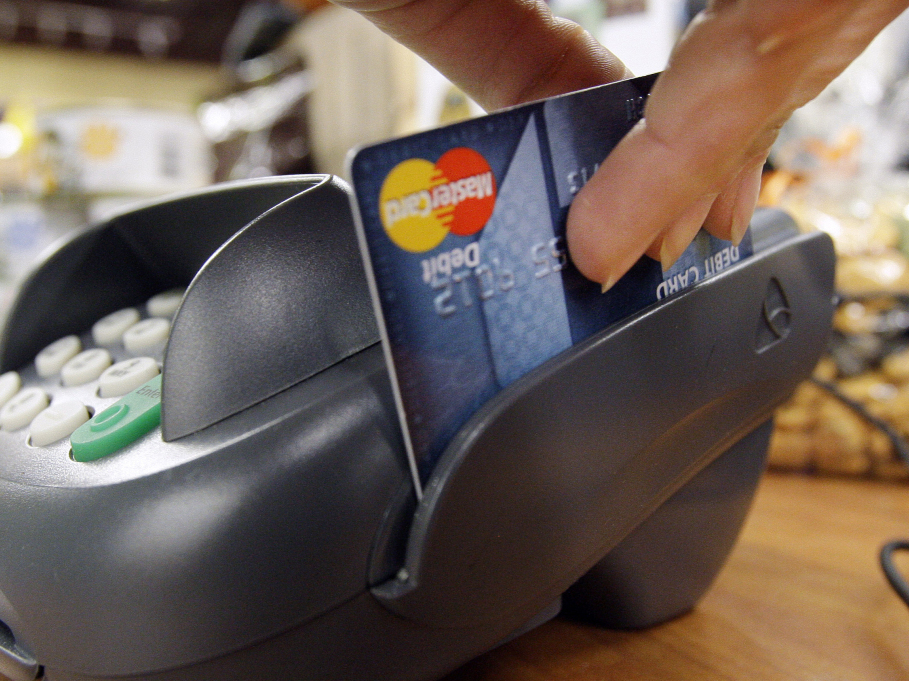 The Nation: You Swipe Card, Banks Swipe Cash : NPR