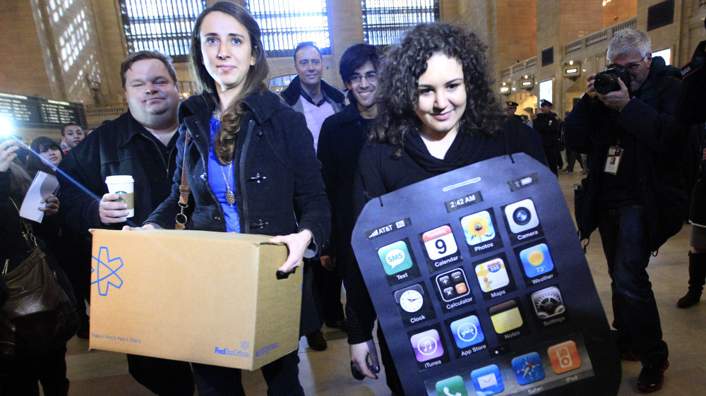 Protesters At Apple Stores Demand 'Ethical' Products : The Two-Way : NPR