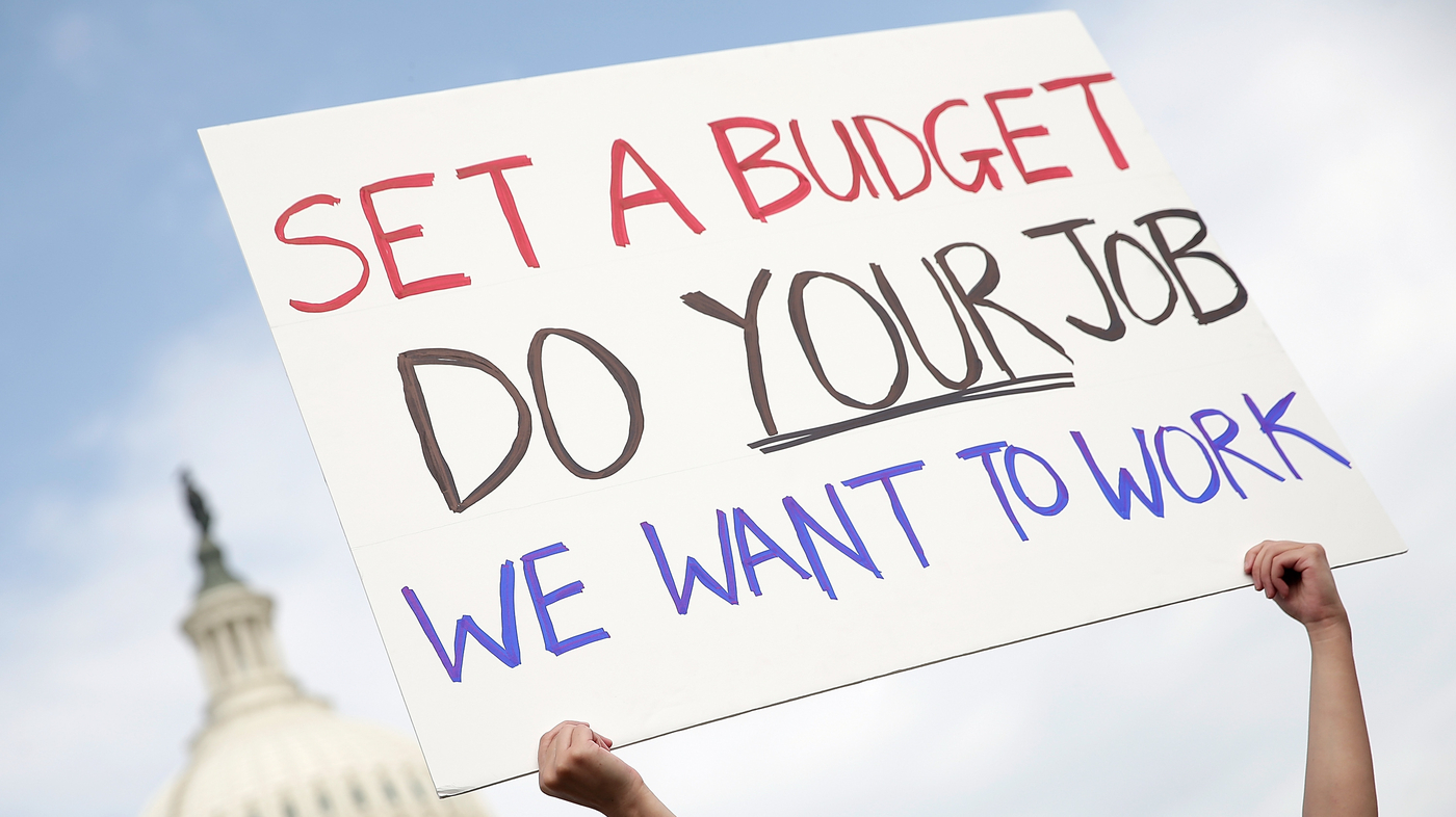 Federal Workers Head Back To Jobs As Government Reopens : The Two-Way : NPR