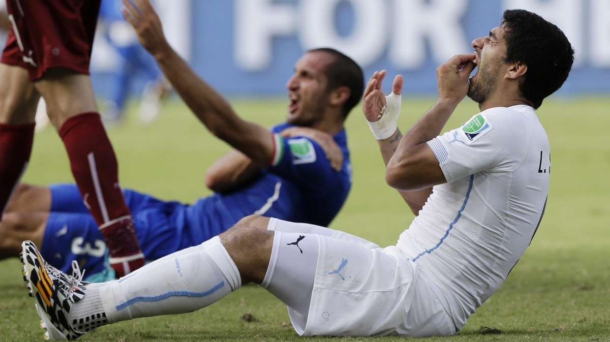 Luis Suarez Apologizes For Biting Rival At World Cup : The Two-Way : NPR