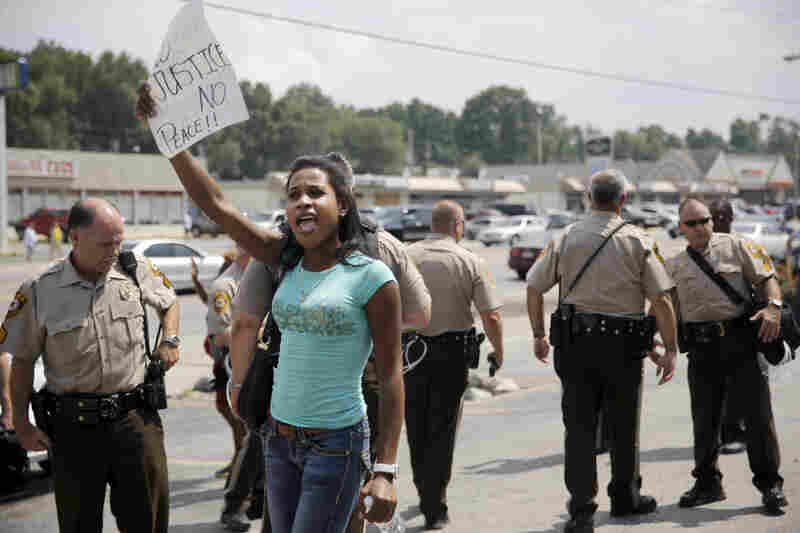 Ferguson Police Use Tear Gas, Flash Grenades To Disperse Protesters ...