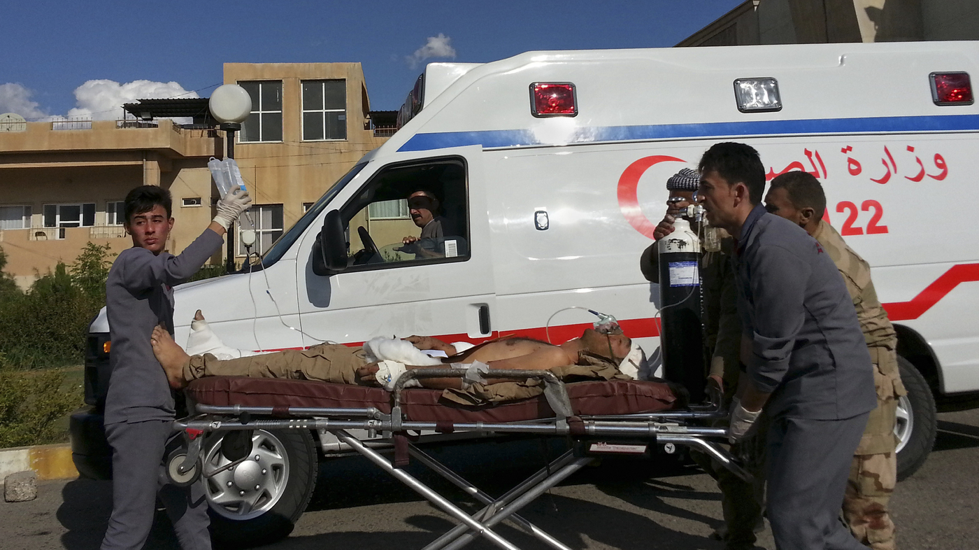 Kurds Retake Syria-Iraq Border Crossing As U.K. Begins Bombing : NPR