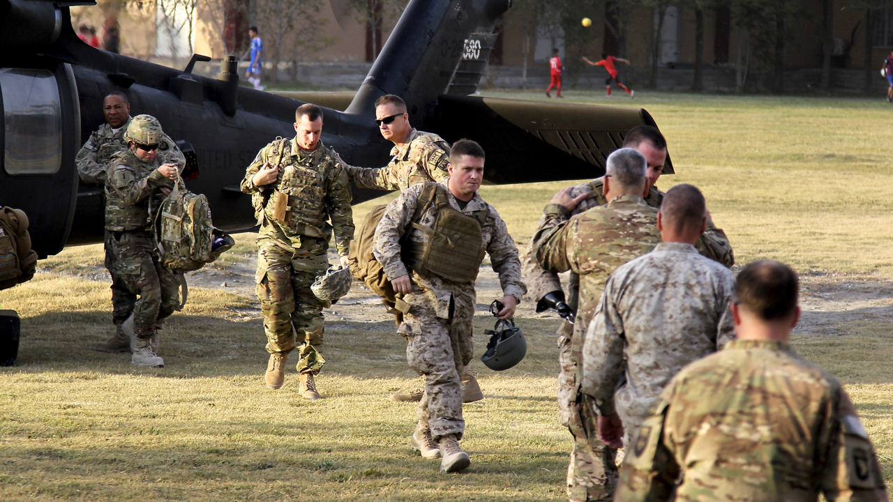 Wounded In Combat, U.S. Troops Go Back For A 'Proper Exit' : Parallels ...