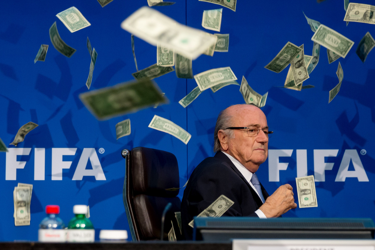 WATCH: Comedian Interrupts FIFA News Conference By Throwing Wads Of ...