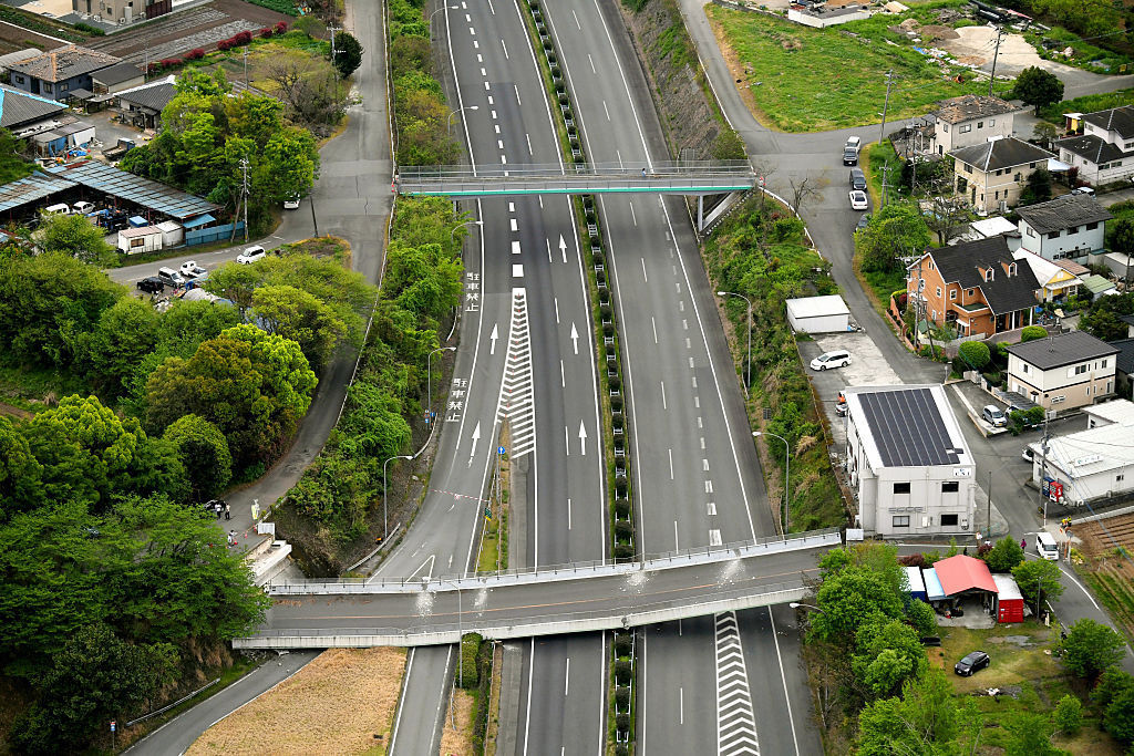 PHOTOS: Rescuers Search For Survivors After Powerful Quakes Hit ...