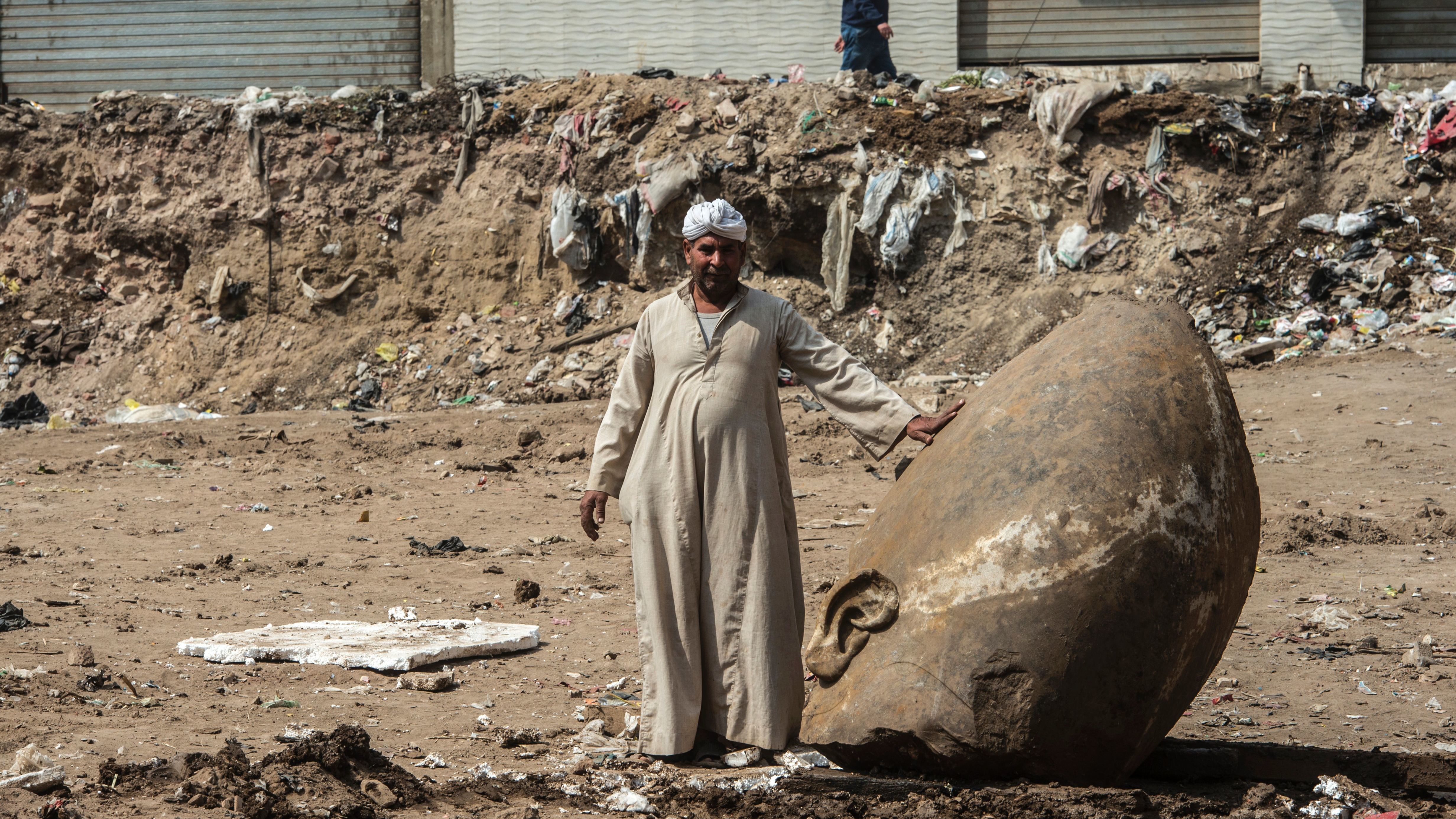 Massive Ancient Statue Discovered Submerged In Mud In Cairo : The Two ...
