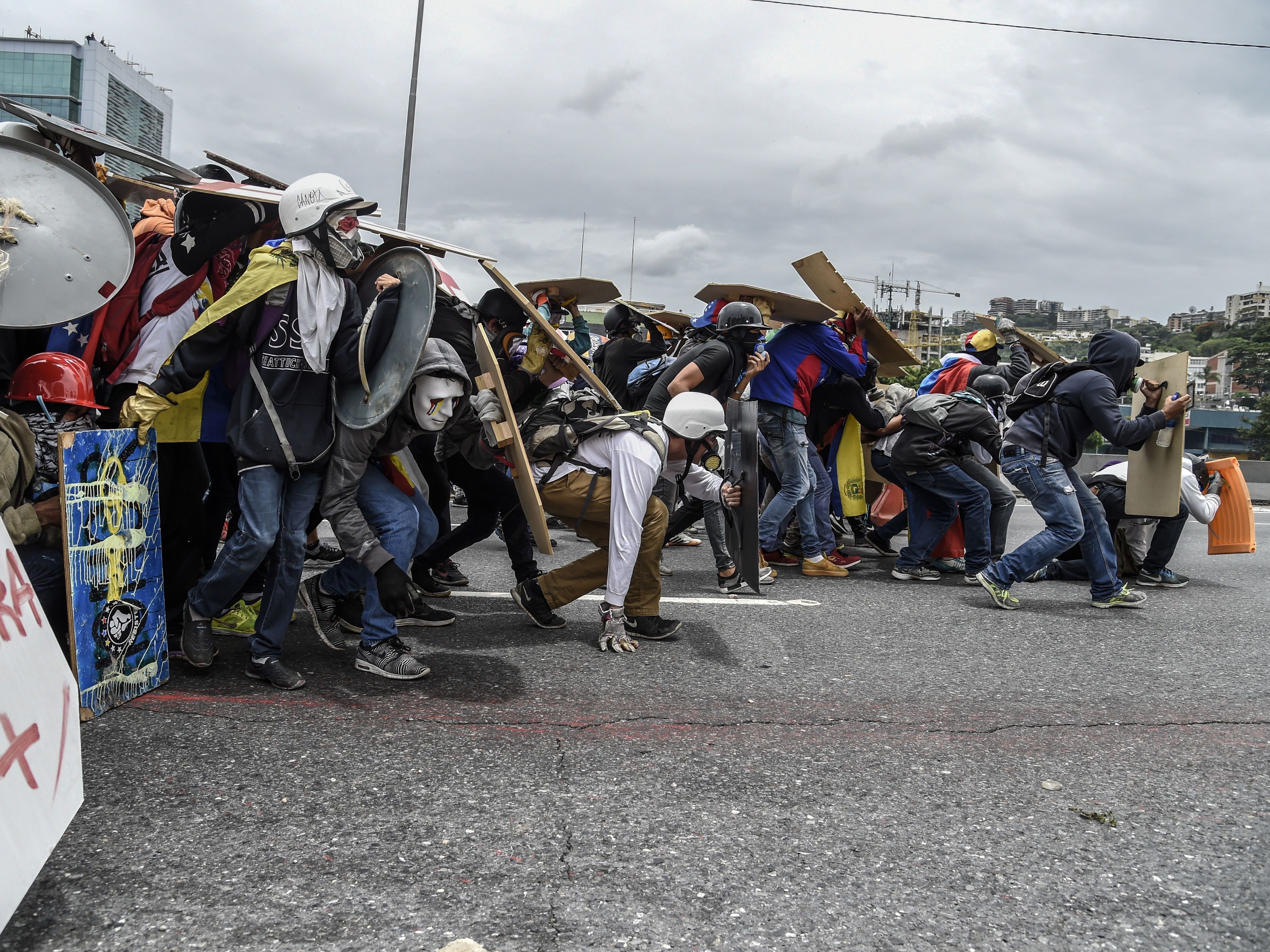 Riven By Fire And Fiery Rhetoric, Venezuela Decides Its Future In The ...