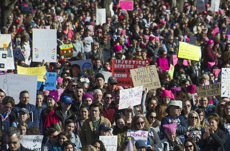 Still 'Pretty Damn Mad' Protesters Unite In Second Annual Women's March ...