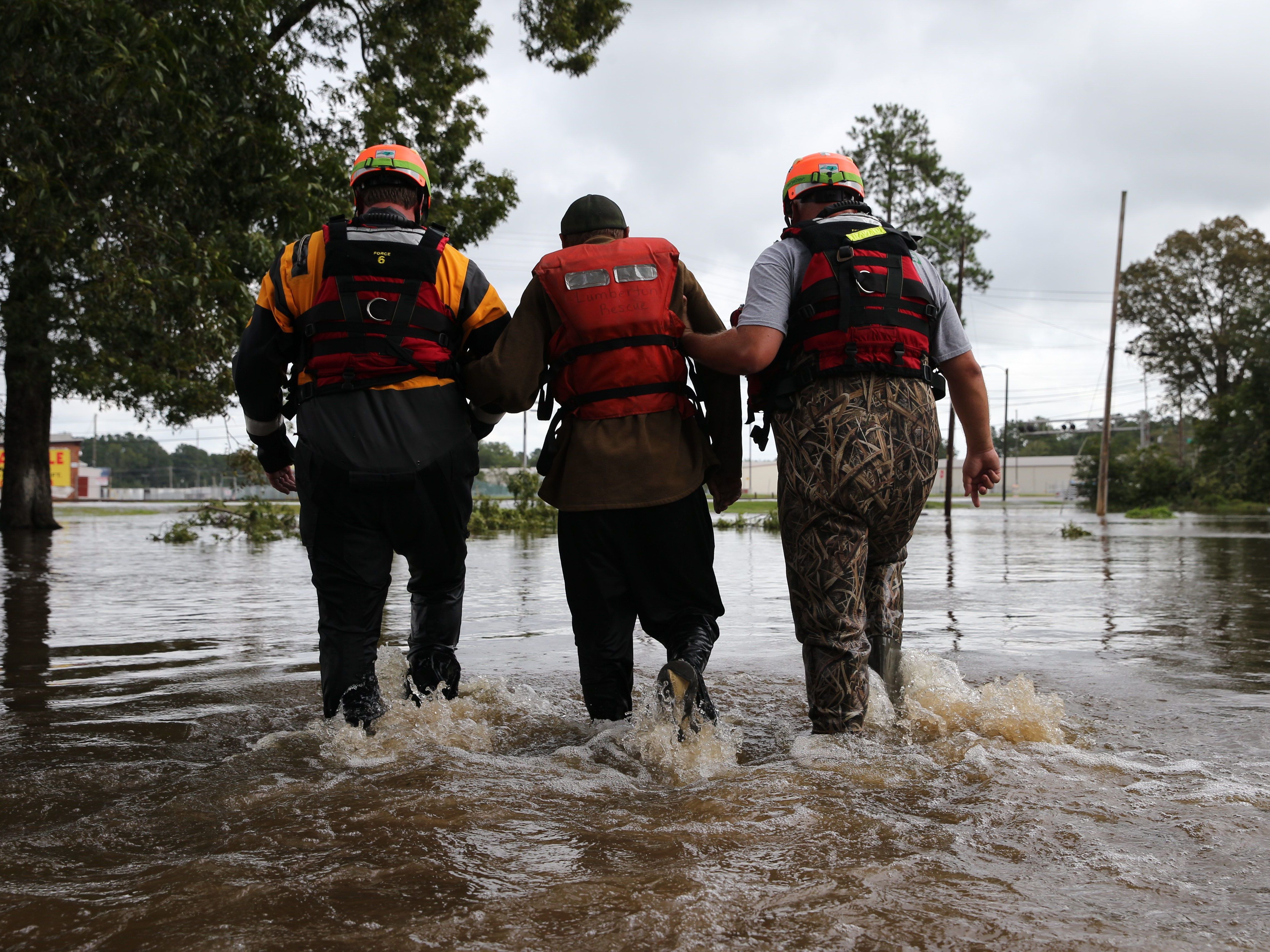Floodwaters Rise In Carolinas, Taking Lives And Prompting Environmental ...