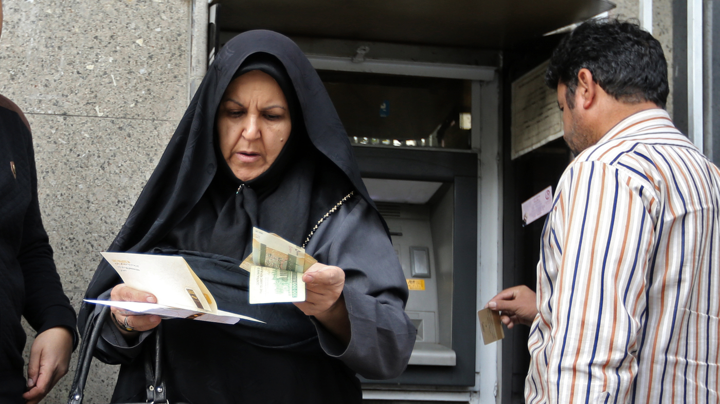 Squeezed By U.S. Sanctions, Iran Has Had An Especially Bad 2018 : NPR