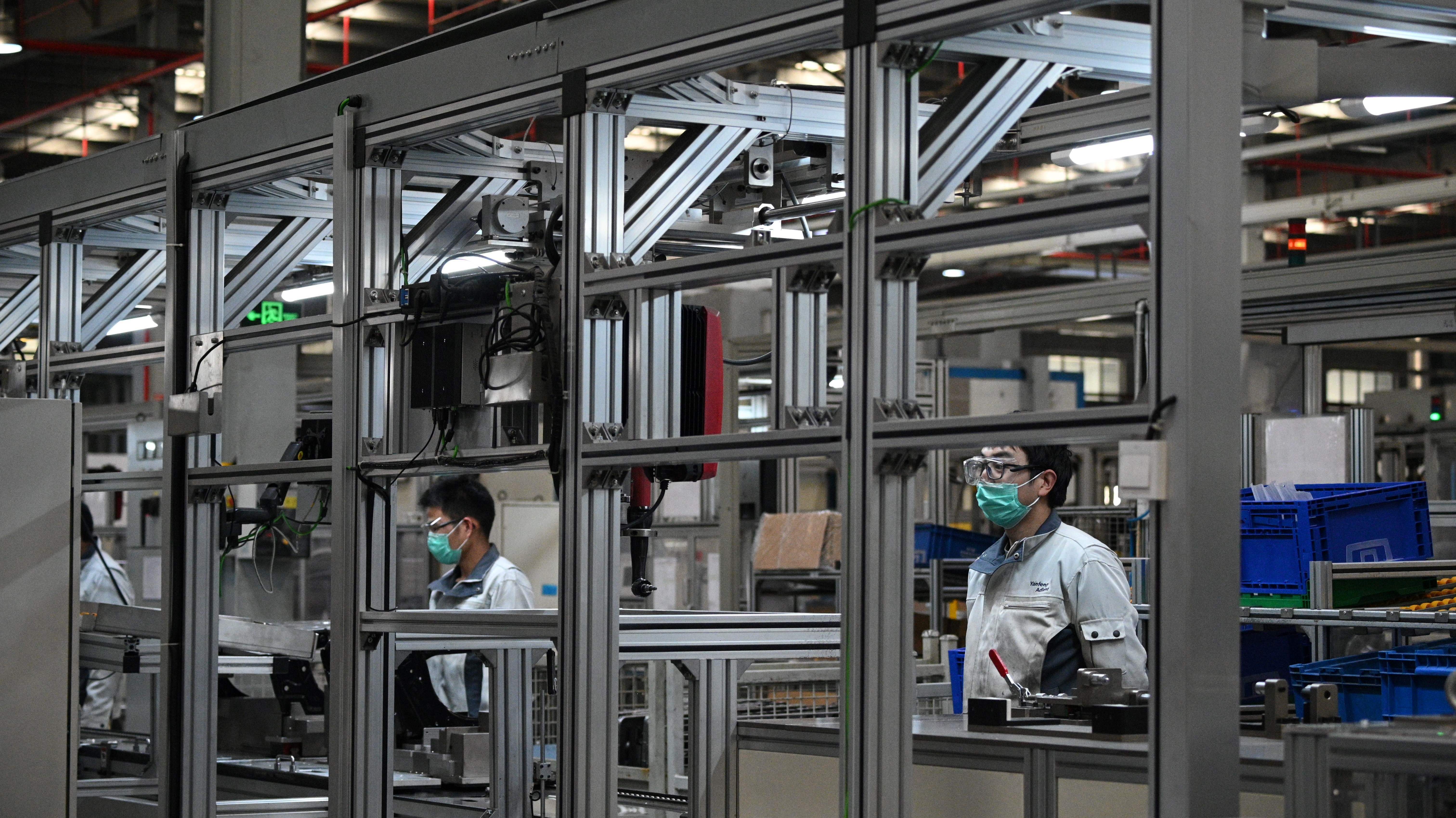 As New Coronavirus Cases Slow In China, Factories Start Reopening | NPR