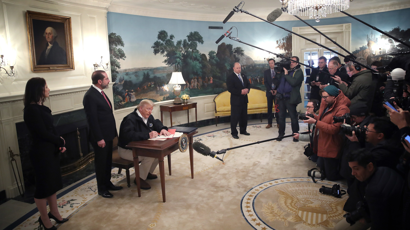 Trump Visits CDC After Coronovirus Fears Throw Plans Into Chaos : NPR