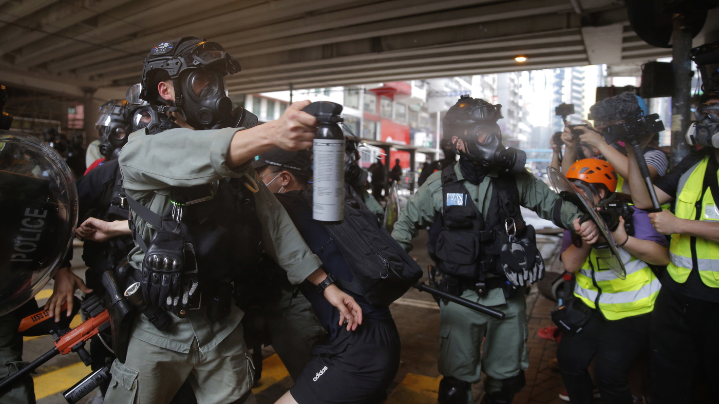 Hong Kong Police Fire Tear Gas As Thousands Protest Planned Security ...