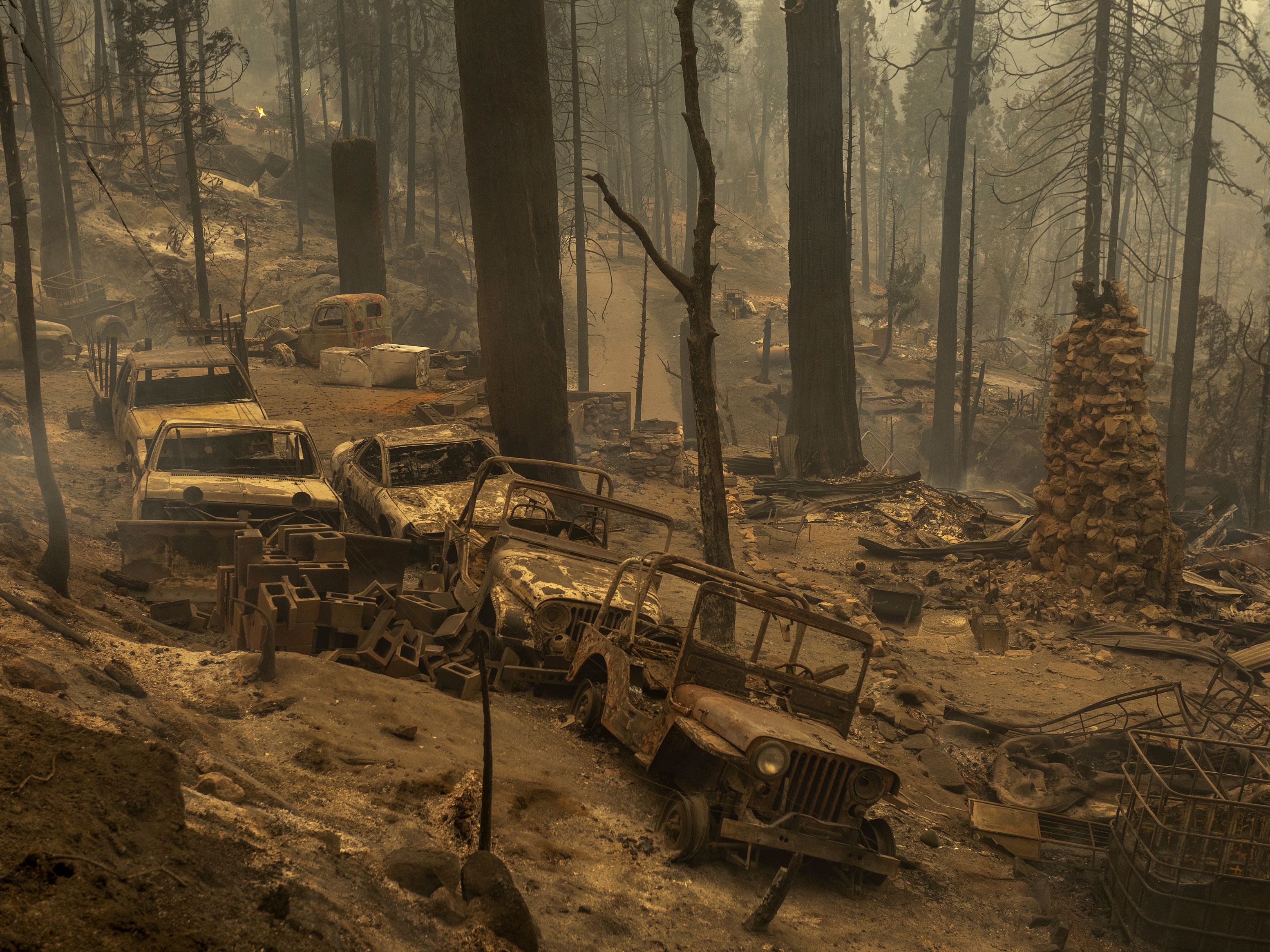 'I Heard Popping And Houses Blowing Up': Deadly Wildfires Rage On West ...