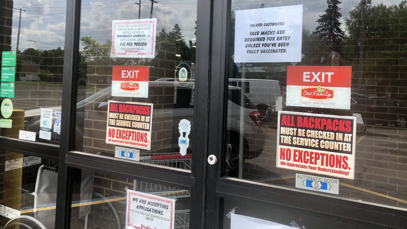 Mask Or No Mask? Confusion Persists As Businesses Decide On Policies : NPR