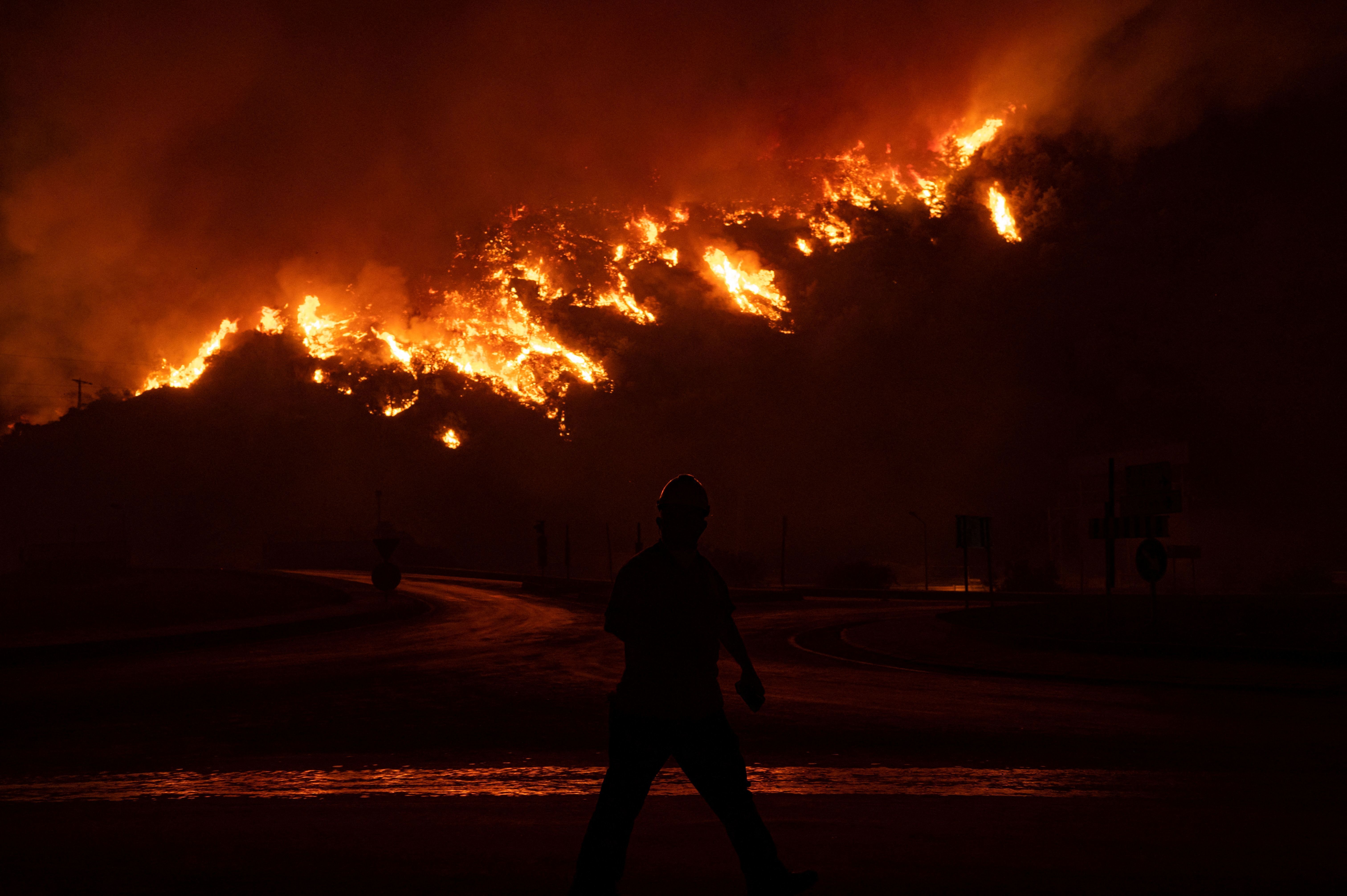 Photos: Wildfires And Flooding Ravage Some Countries Of The ...