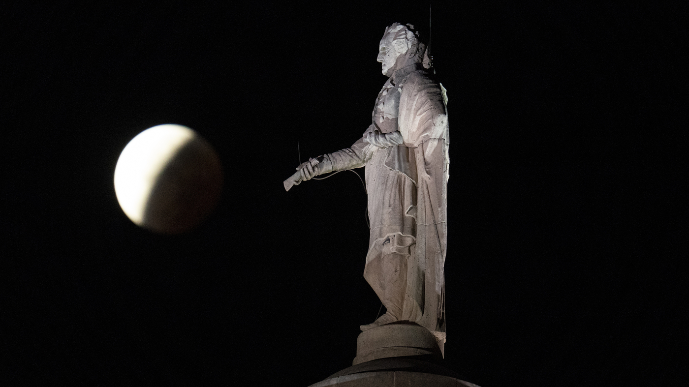 Photos from the historic lunar eclipse around the world : NPR