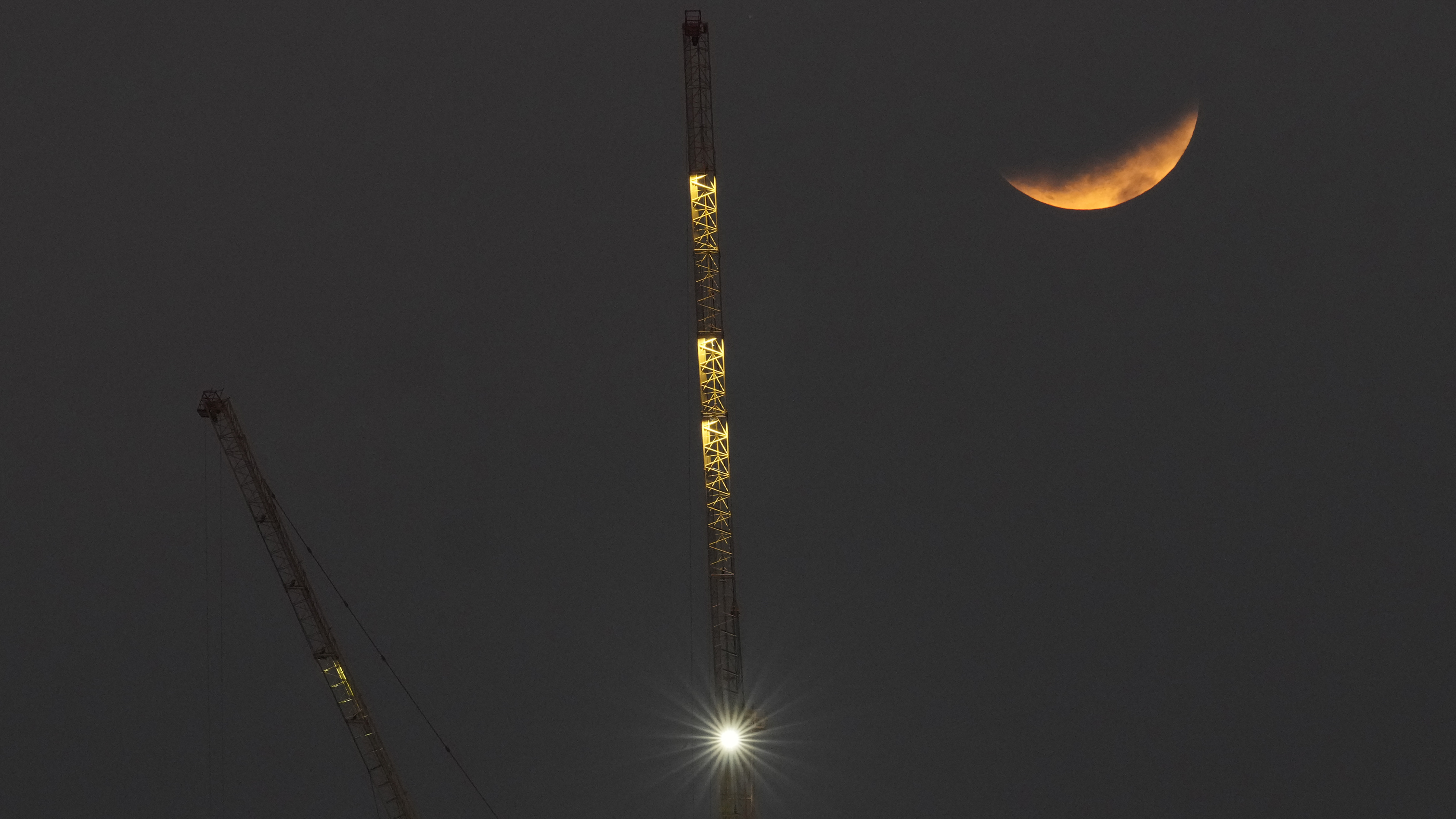 Photos from the historic lunar eclipse around the world : NPR