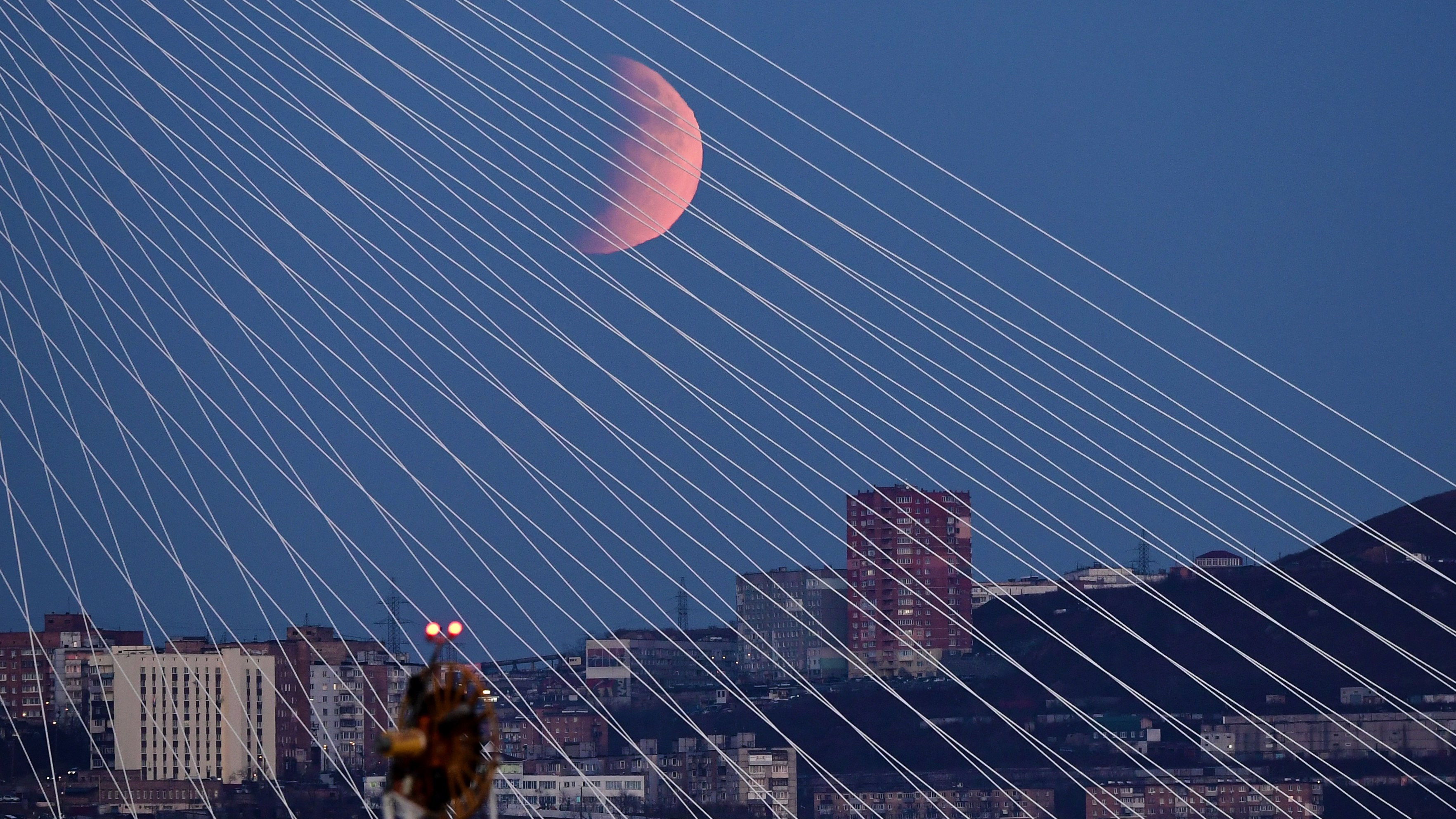 Photos from the historic lunar eclipse around the world : NPR
