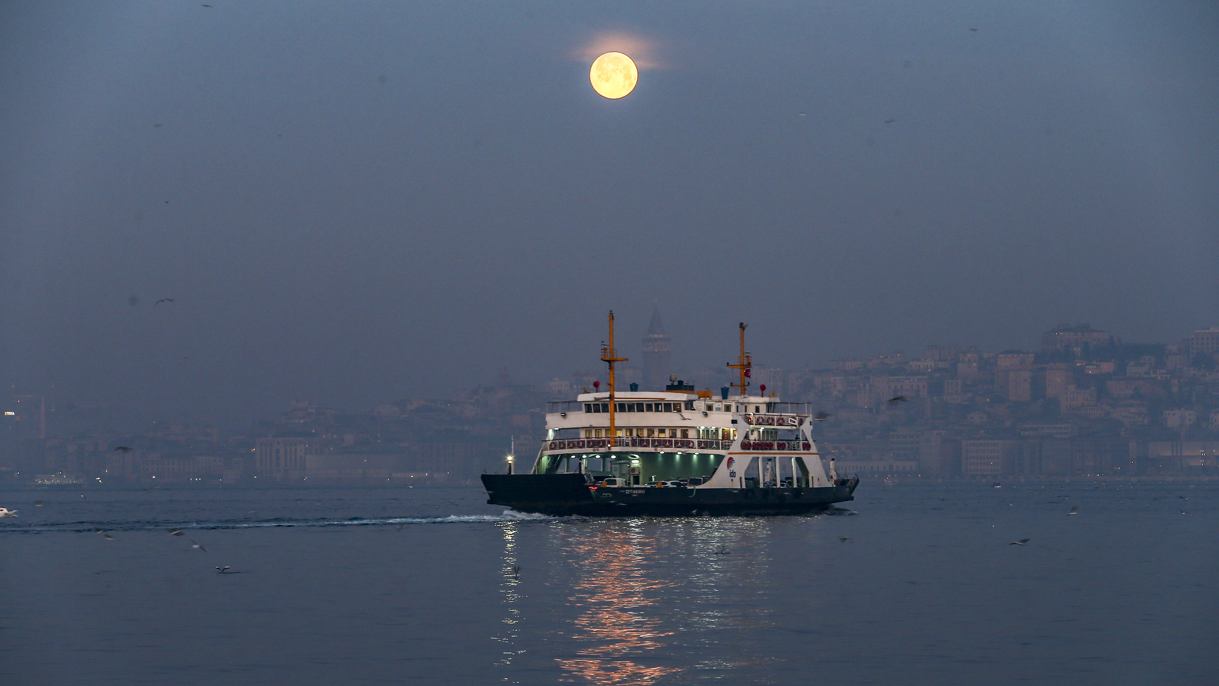 Photos: February's 'Snow Moon' rises full and bright : NPR