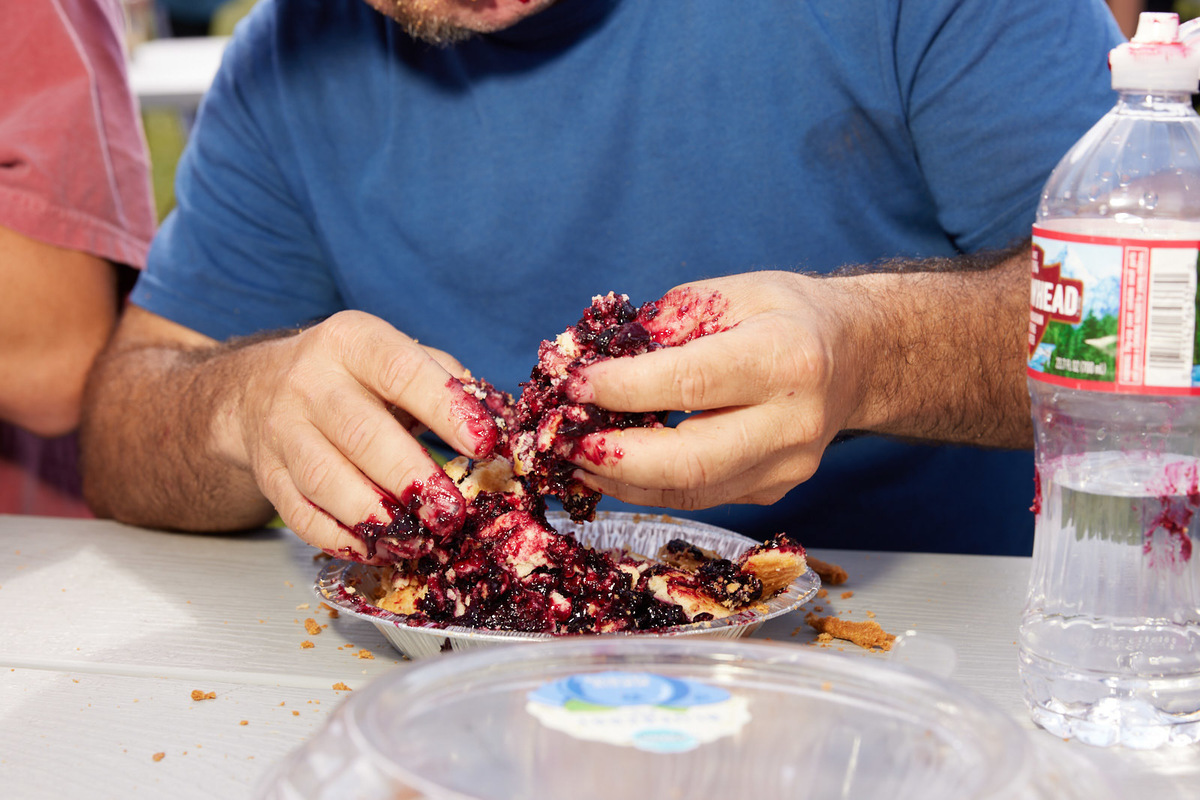 Pi Day photos of pie-eating contests that reemerged after COVID ...
