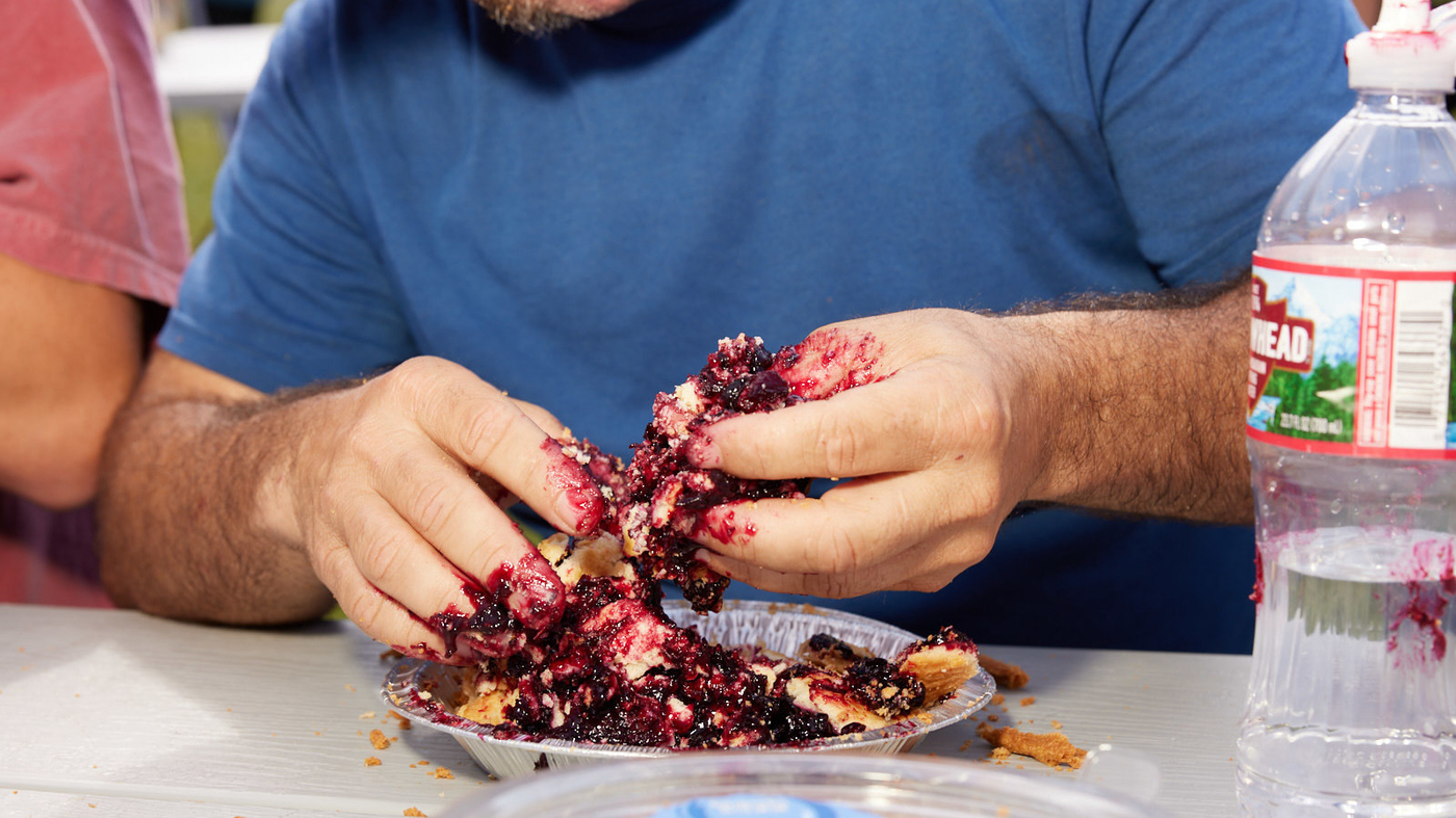 Pi Day photos of pie-eating contests that reemerged after COVID ...