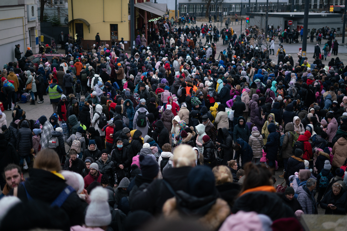 Photos: Displaced Ukrainians flee to Lviv, where aid resources are ...