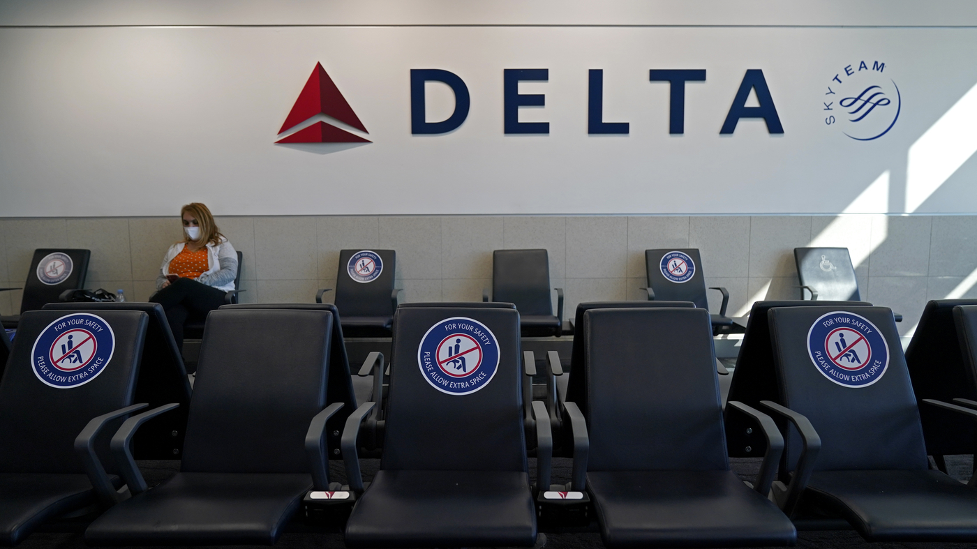 Delta will begin paying flight attendants for flight boarding time : NPR
