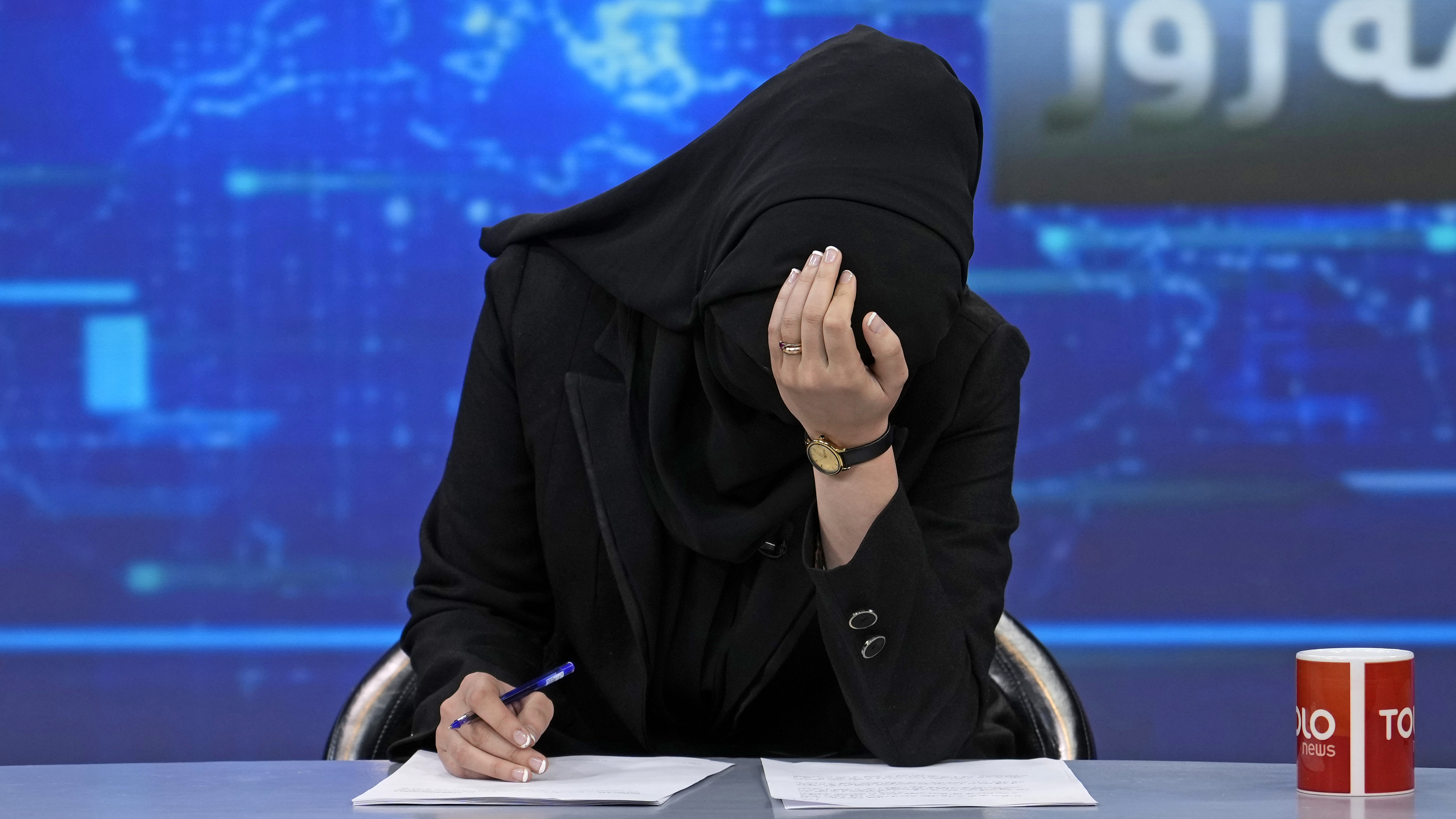 After Taliban orders female anchors to mask on TV, male journalists ...