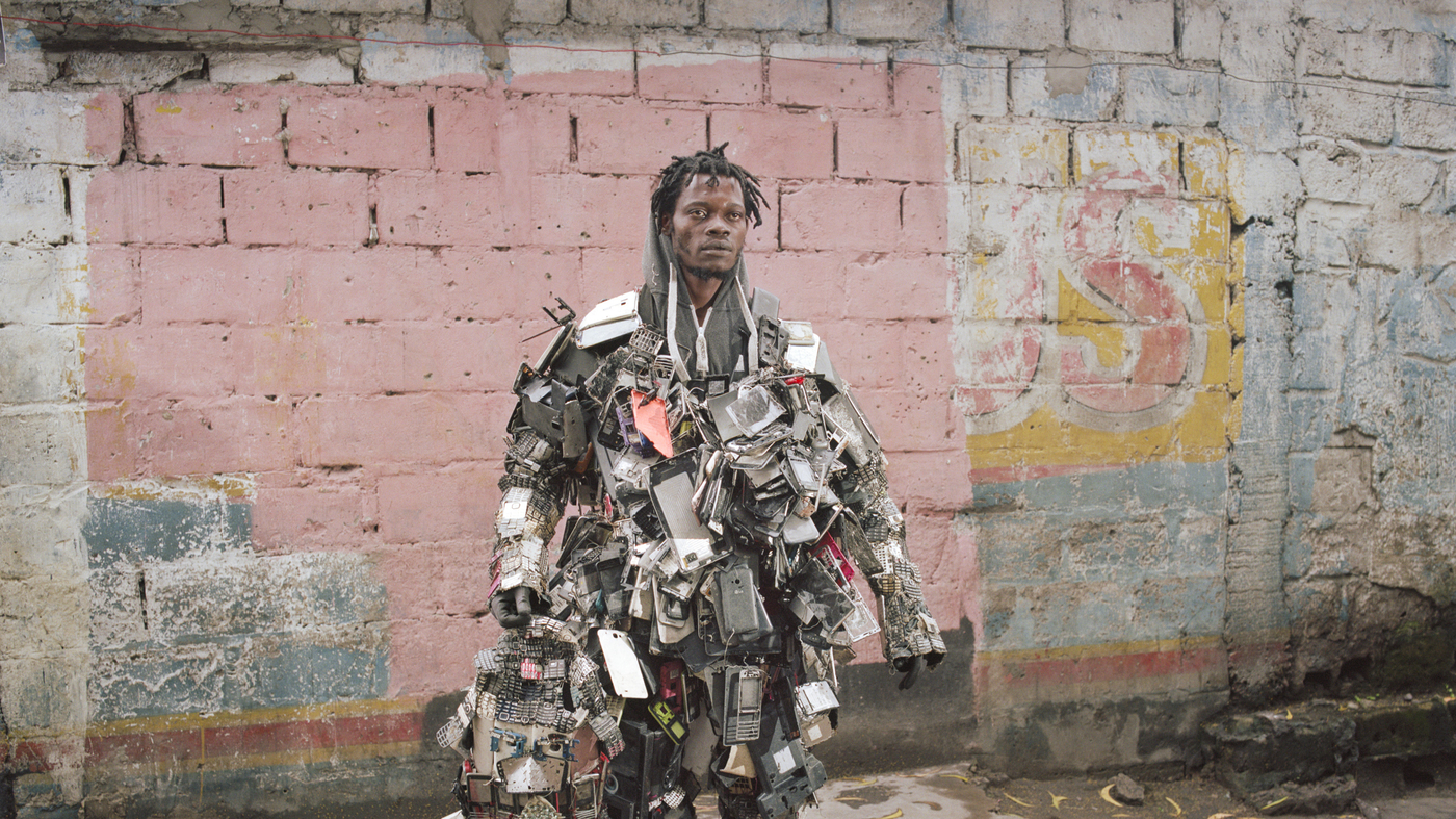 Artists highlight a city's woes with fantastical costumes made out of ...