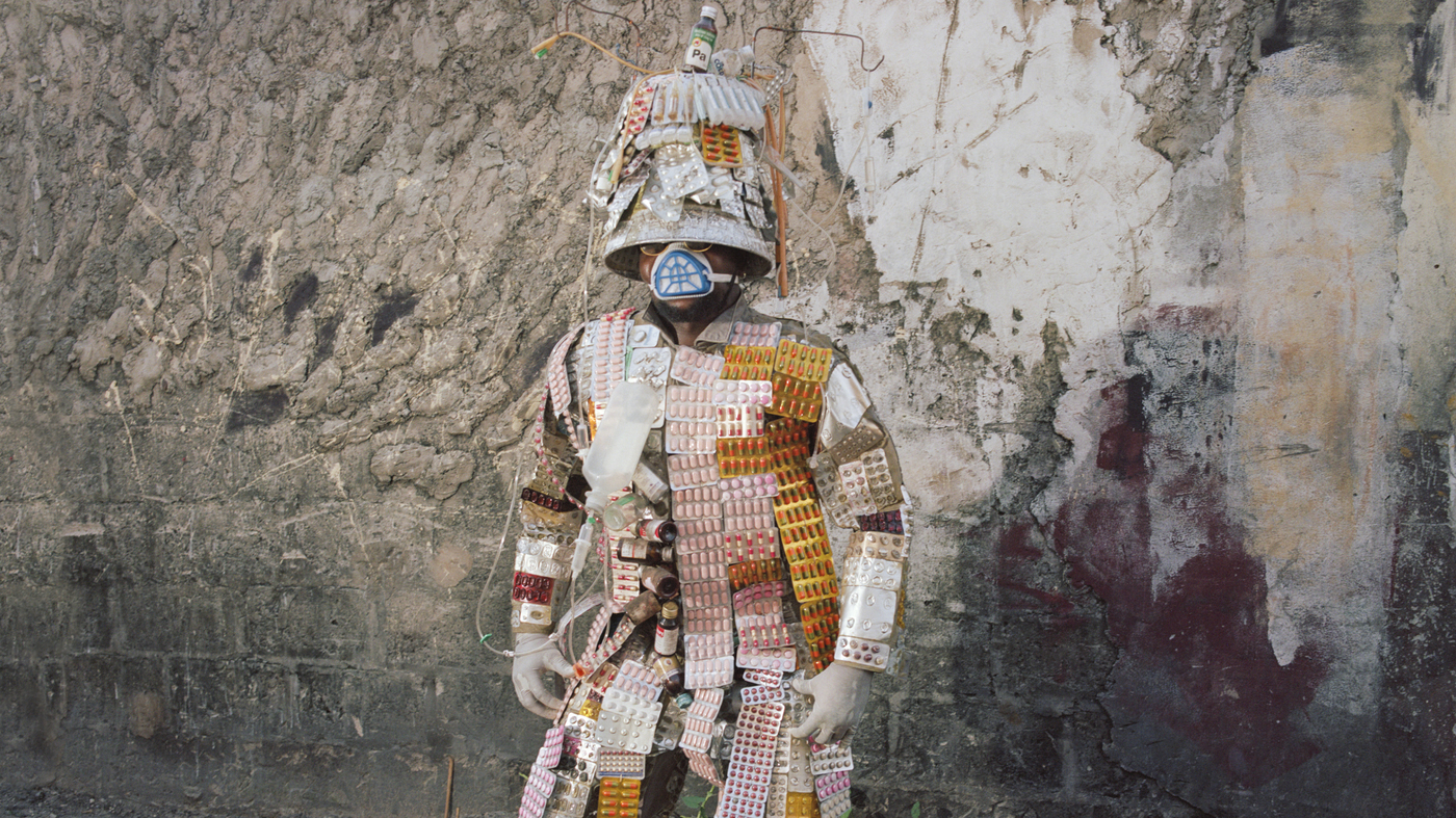 Artists highlight a city's woes with fantastical costumes made out of ...