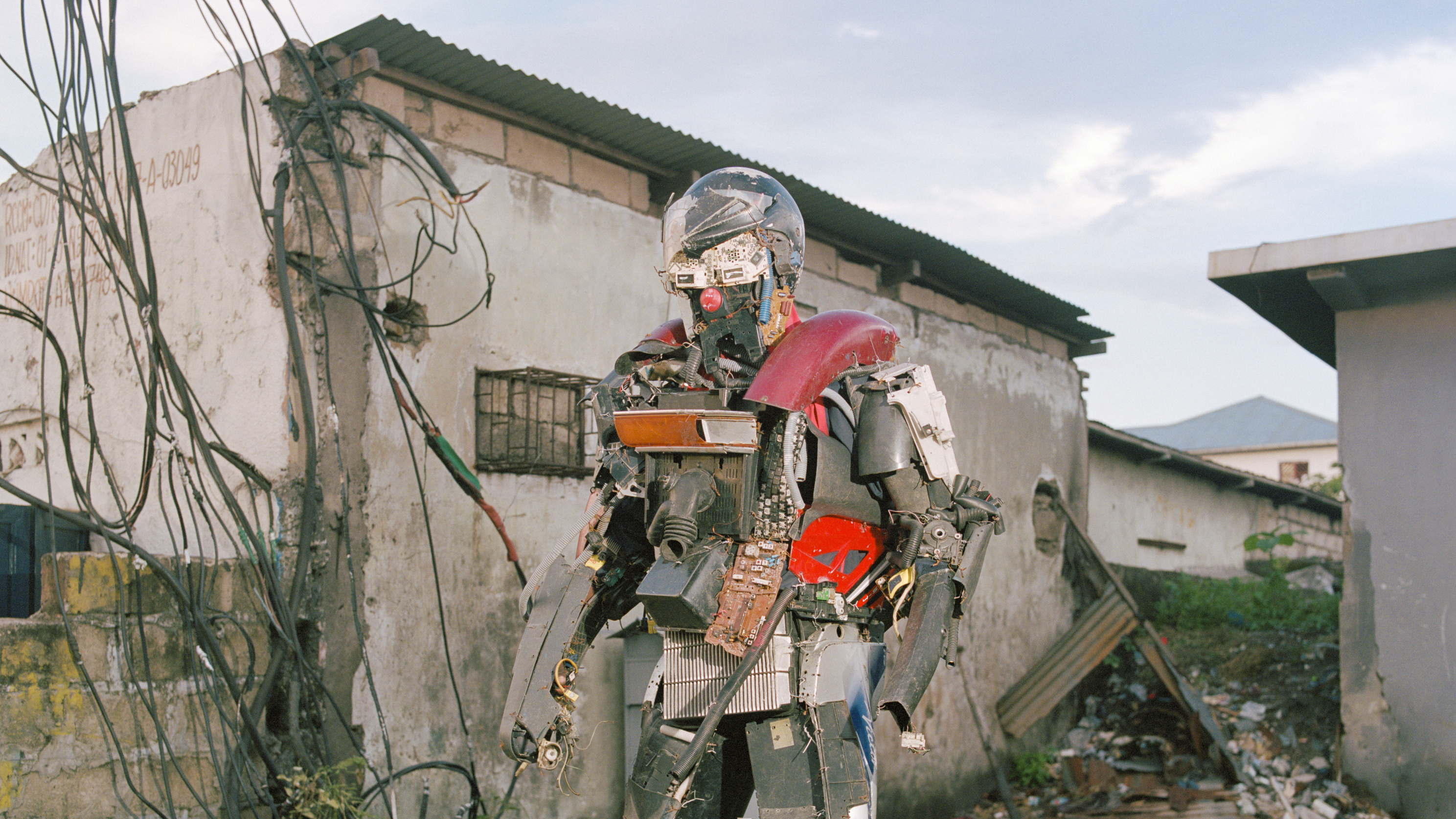 Artists highlight a city's woes with fantastical costumes made out of ...