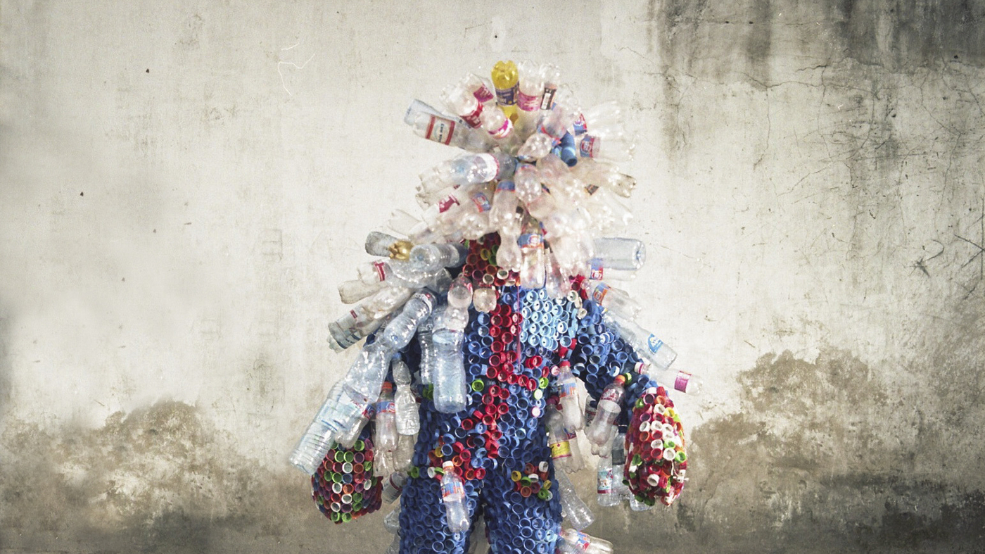 Artists highlight a city's woes with fantastical costumes made out of ...