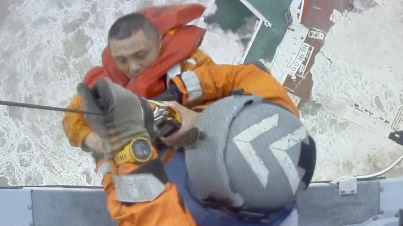 Dozens are feared lost after a ship sinks in a typhoon in the South ...