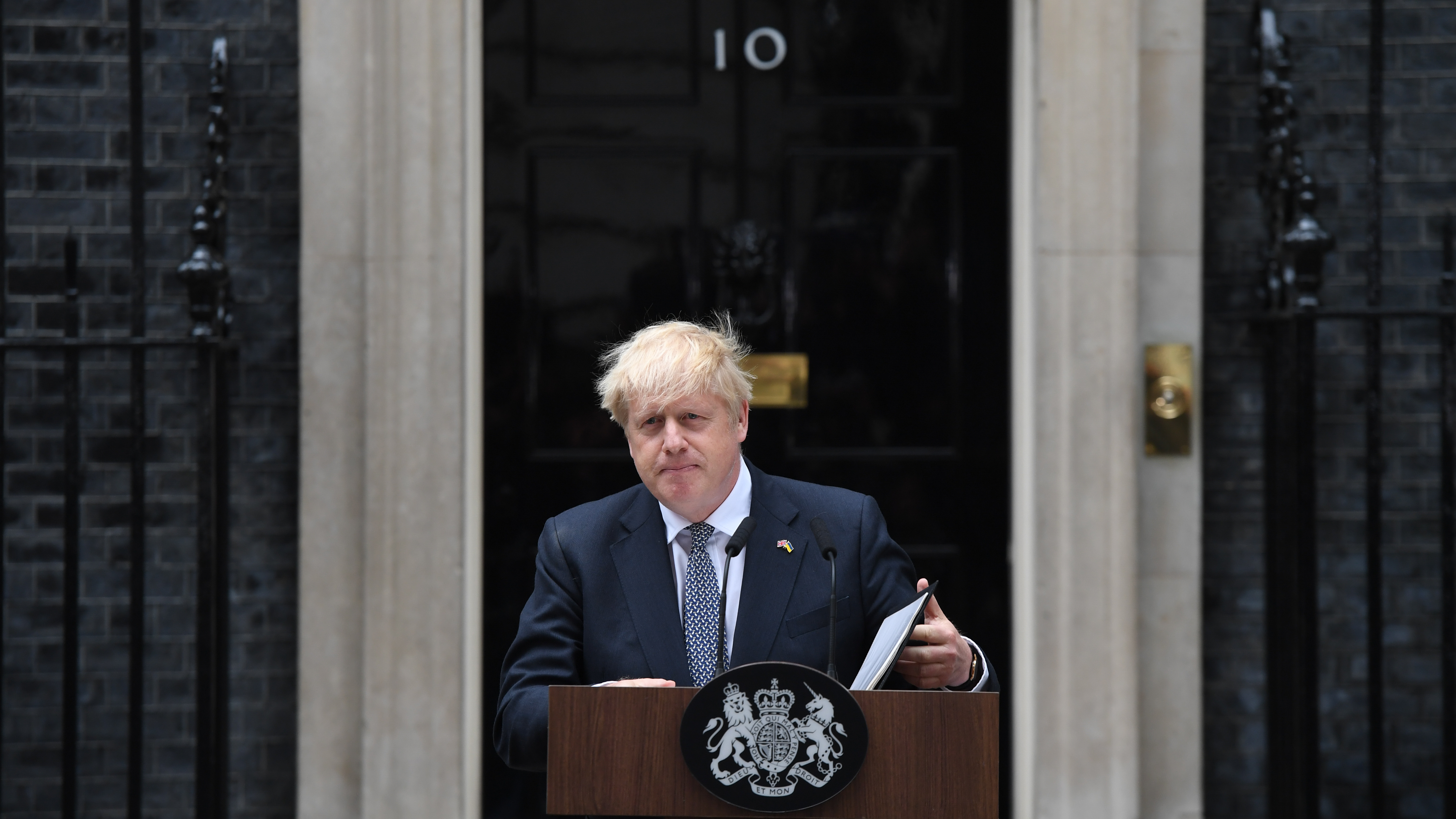 U.K. Prime Minister Boris Johnson resigns as head of his Conservative ...