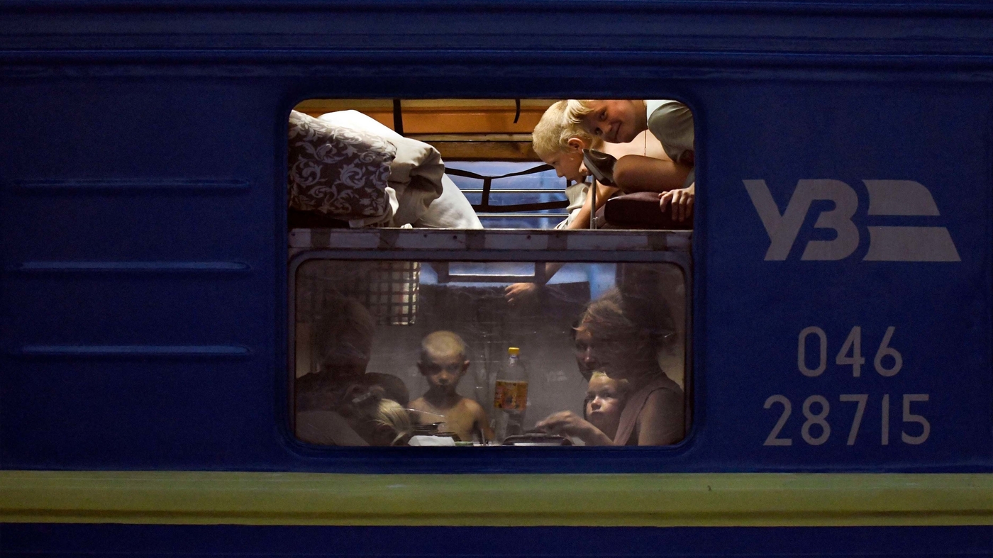 Riding Ukraine's last train line out of Donbas with families fleeing ...