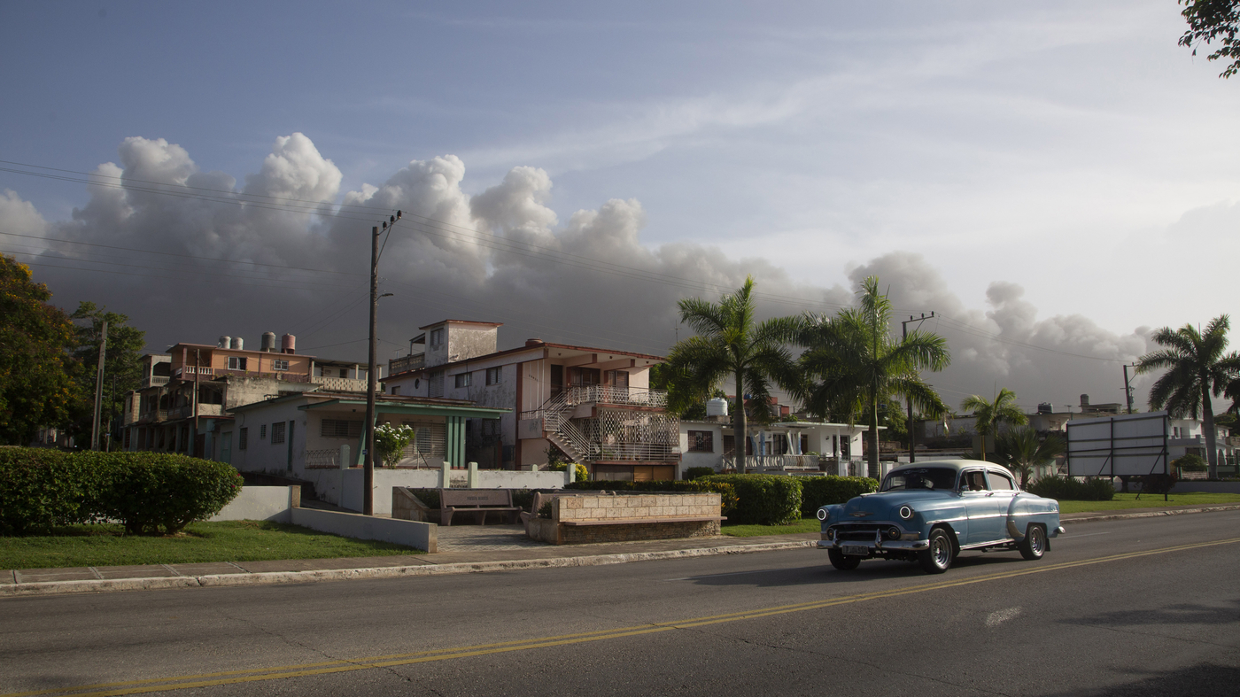 A raging fire consumes a fourth tank at a Cuban oil storage facility : NPR