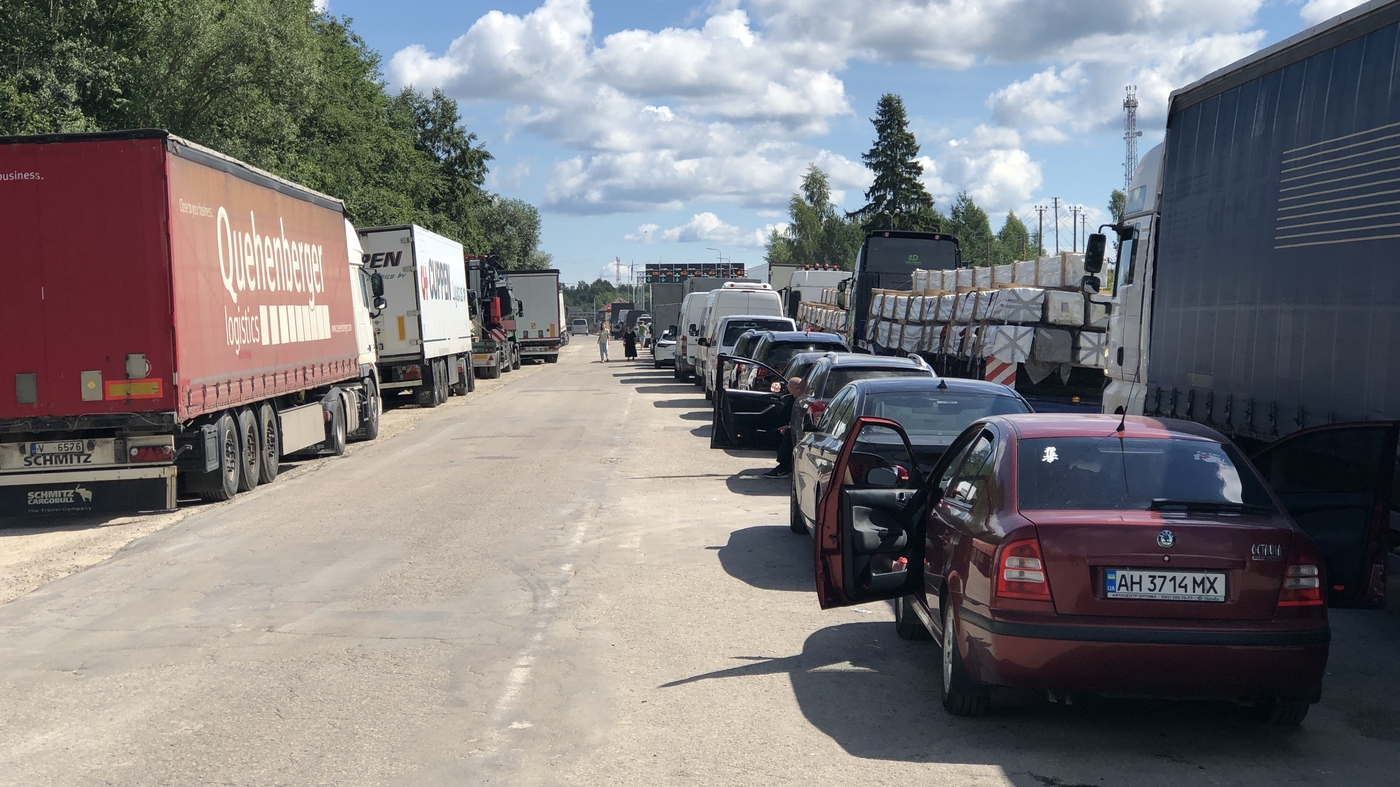 At Latvia's border with Russia, the line grows long, and tempers short ...