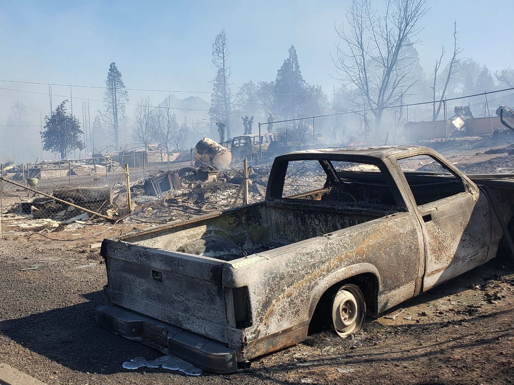 A Northern California wildfire has injured several people and destroyed ...
