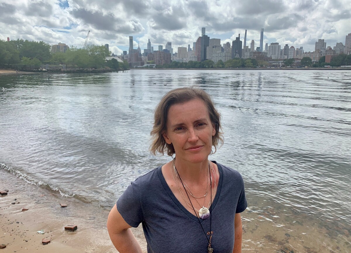 This artist gets up to her neck in water to spread awareness of climate ...