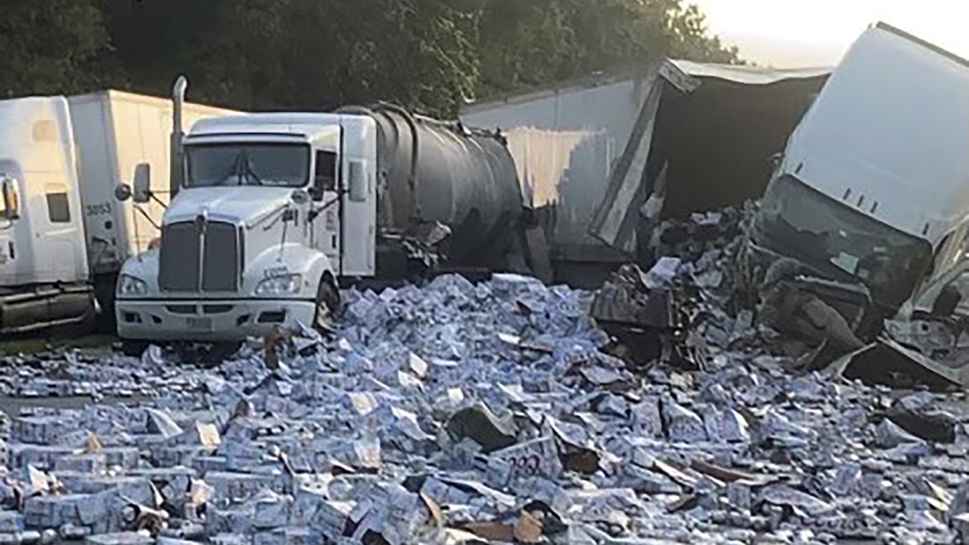 Florida highway covered by Coors Light beer cans after a truck accident ...