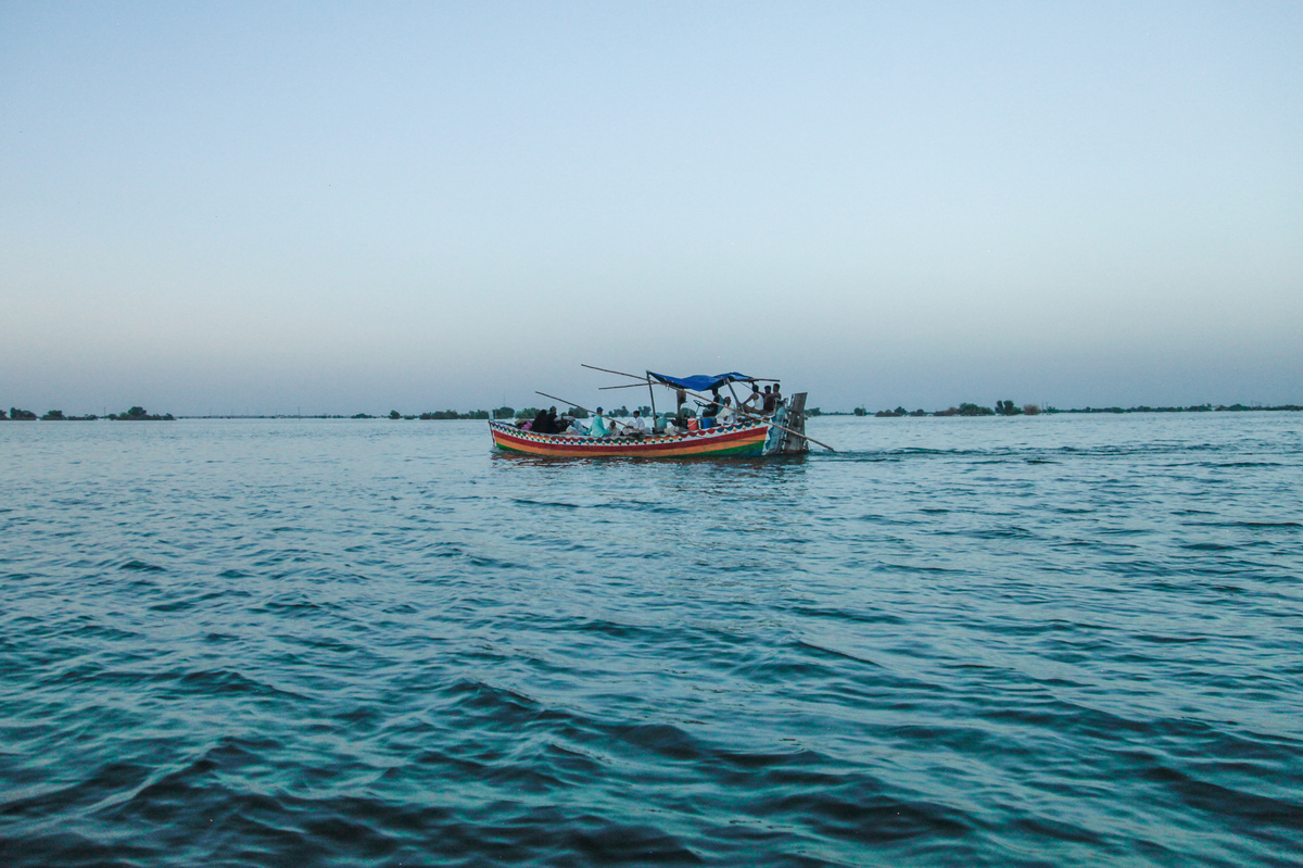 Fishermen offer a lifeline to Pakistan's flooded villages : NPR