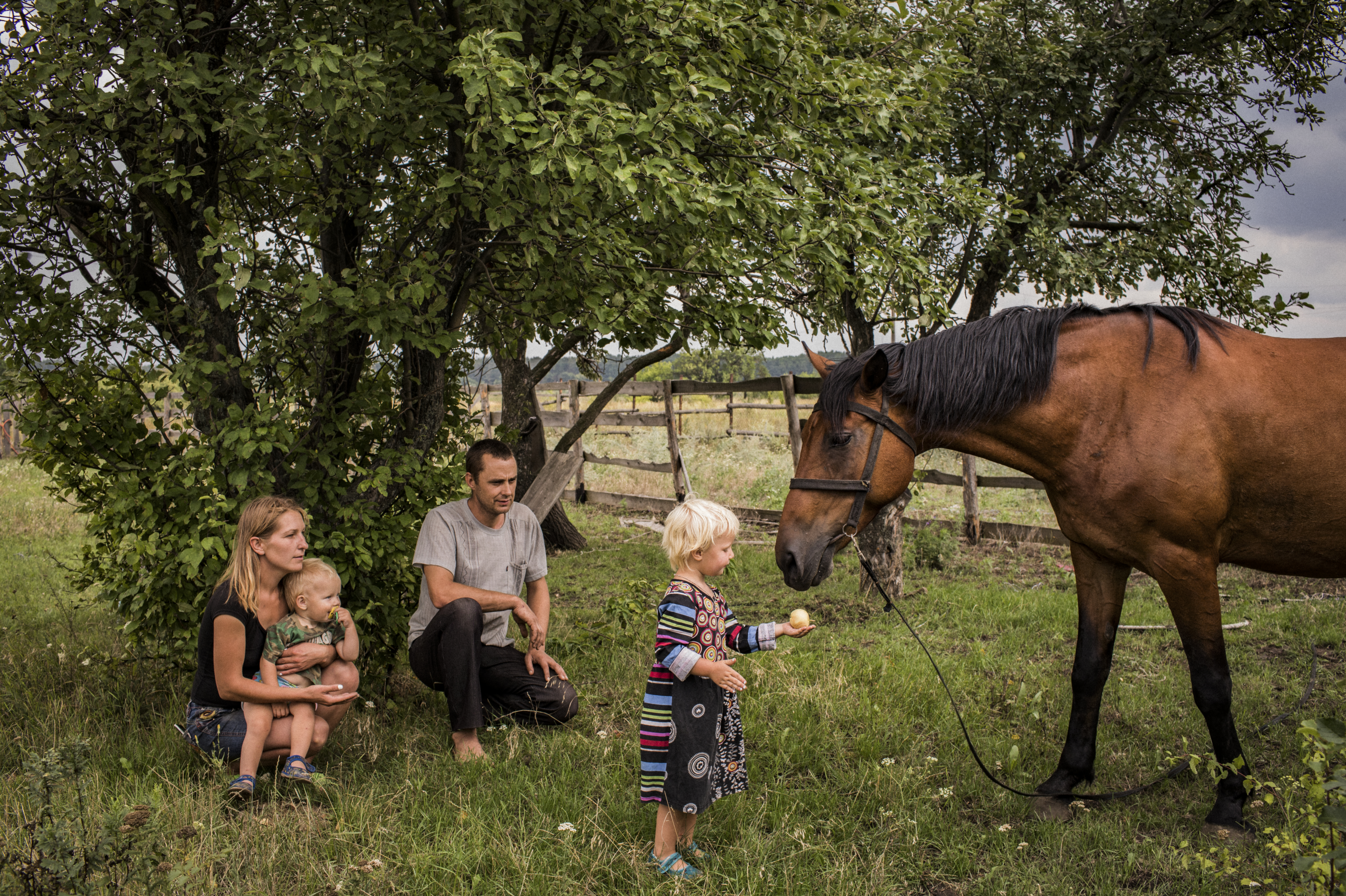 The Ukraine war isn't new. These intimate photos show 3 families ...