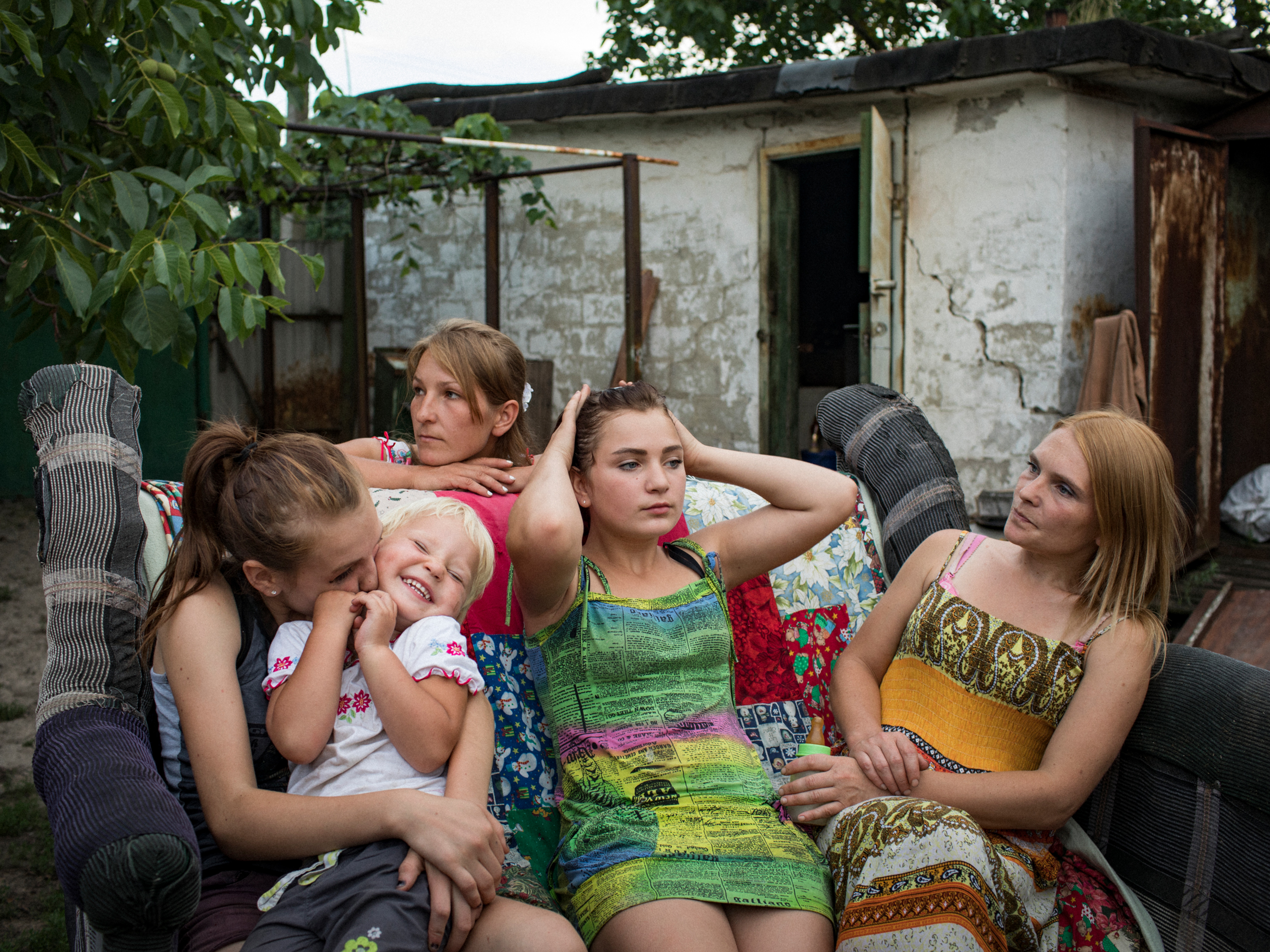 The Ukraine war isn't new. These intimate photos show 3 families ...