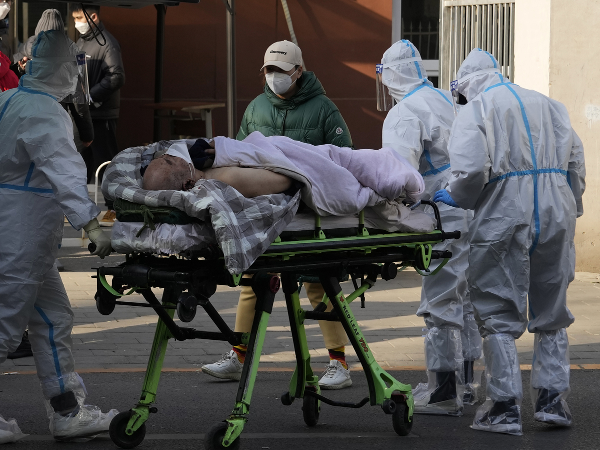 China struggles with COVID infections after controls ease : NPR