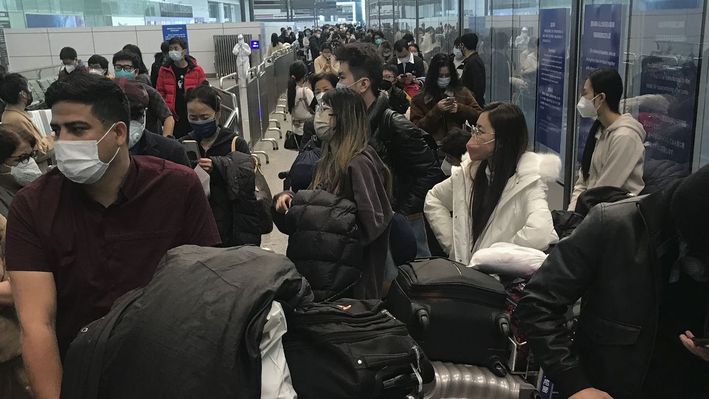 Companies welcome end to China quarantines for visitors : NPR